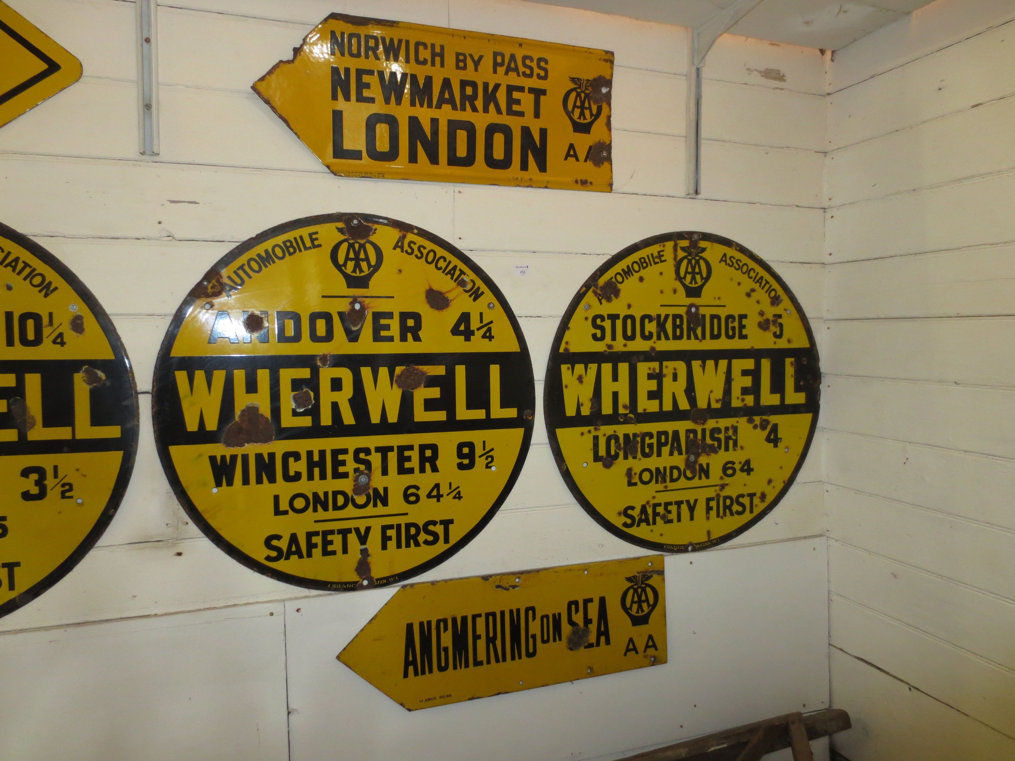 Bonhams Cars : Four AA enamel signs,