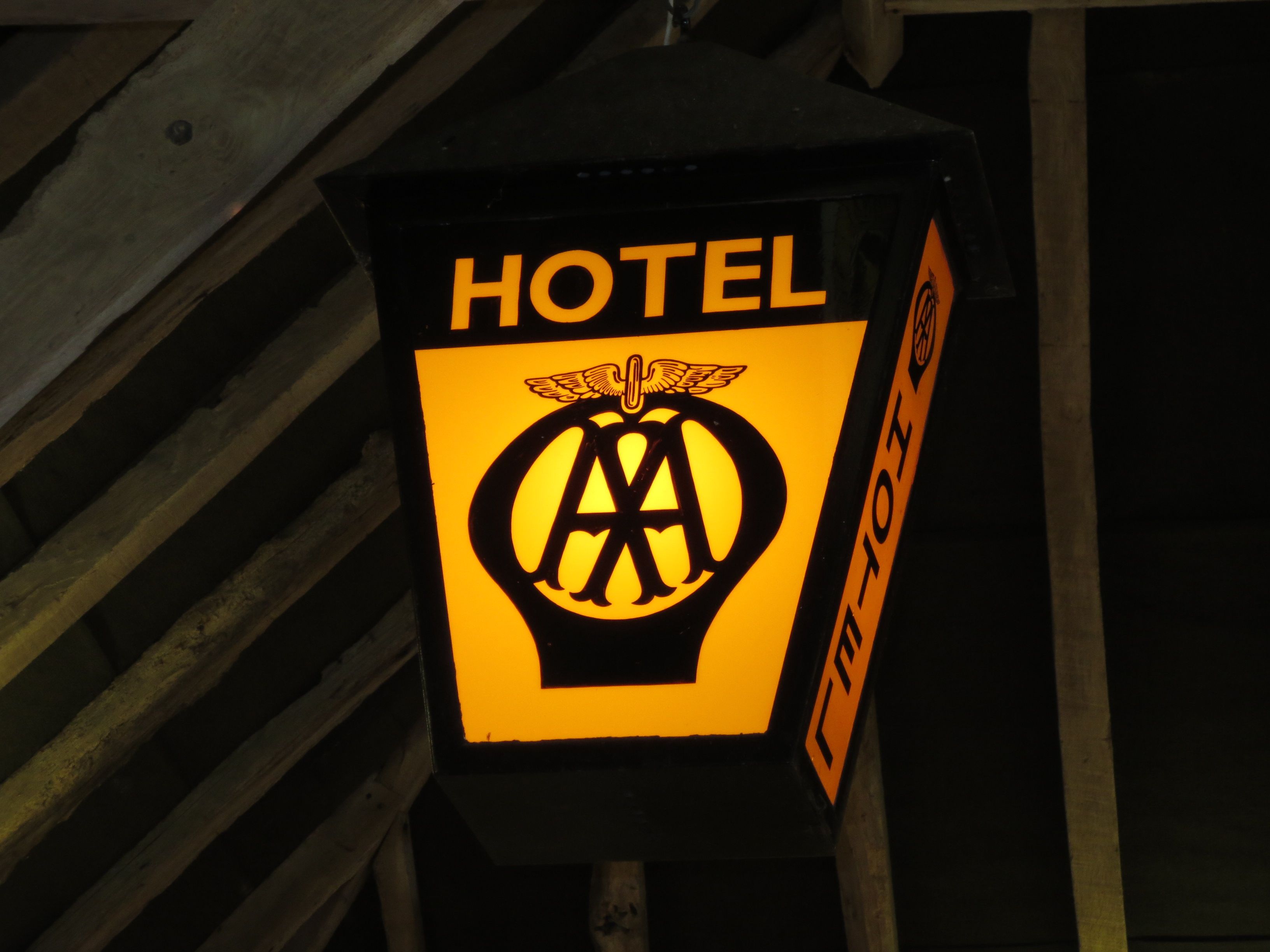 Bonhams Cars : An AA Hotel illuminated hanging sign,