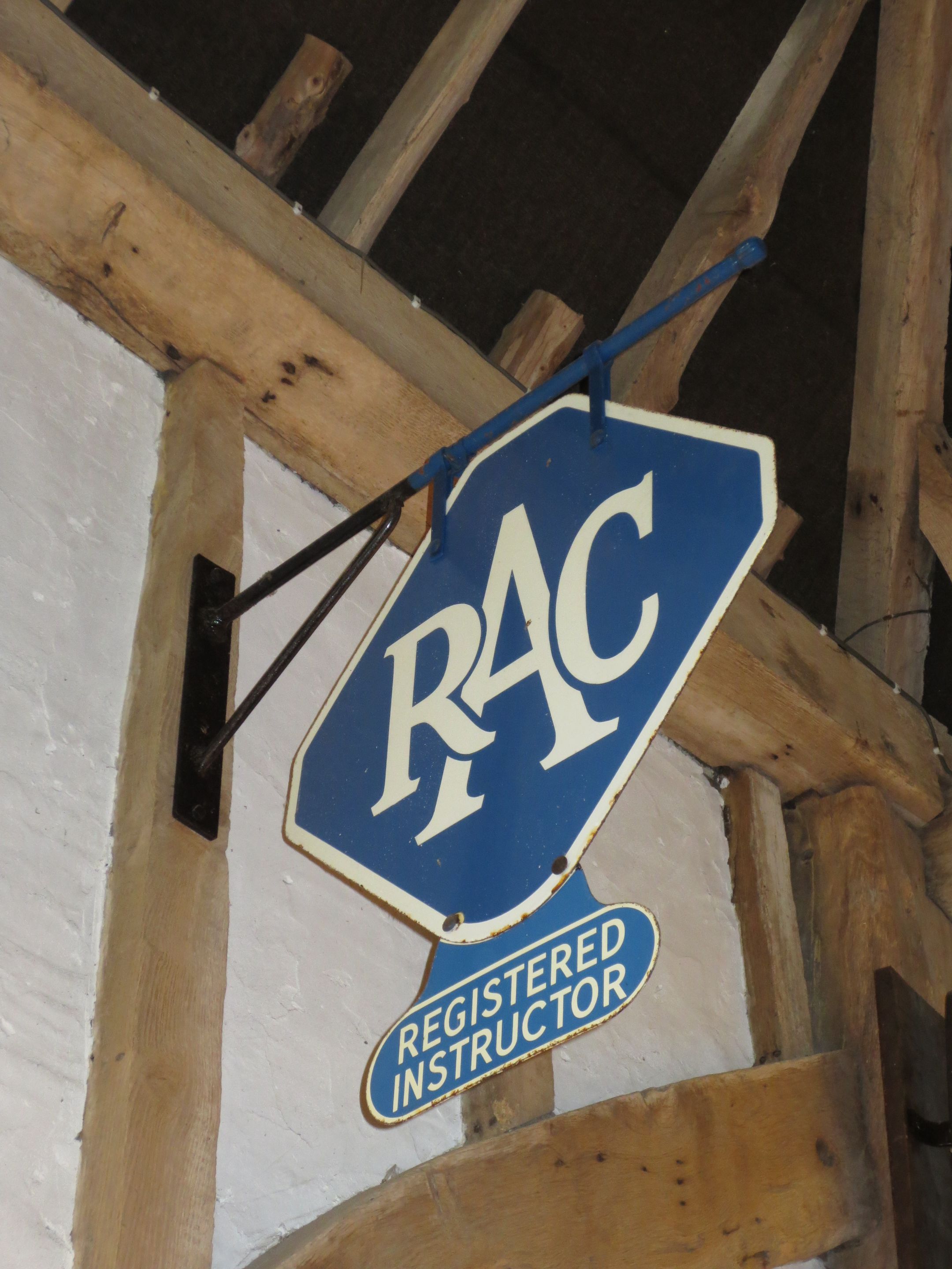 Bonhams Cars : An RAC Registered Instructor enamel hanging sign,