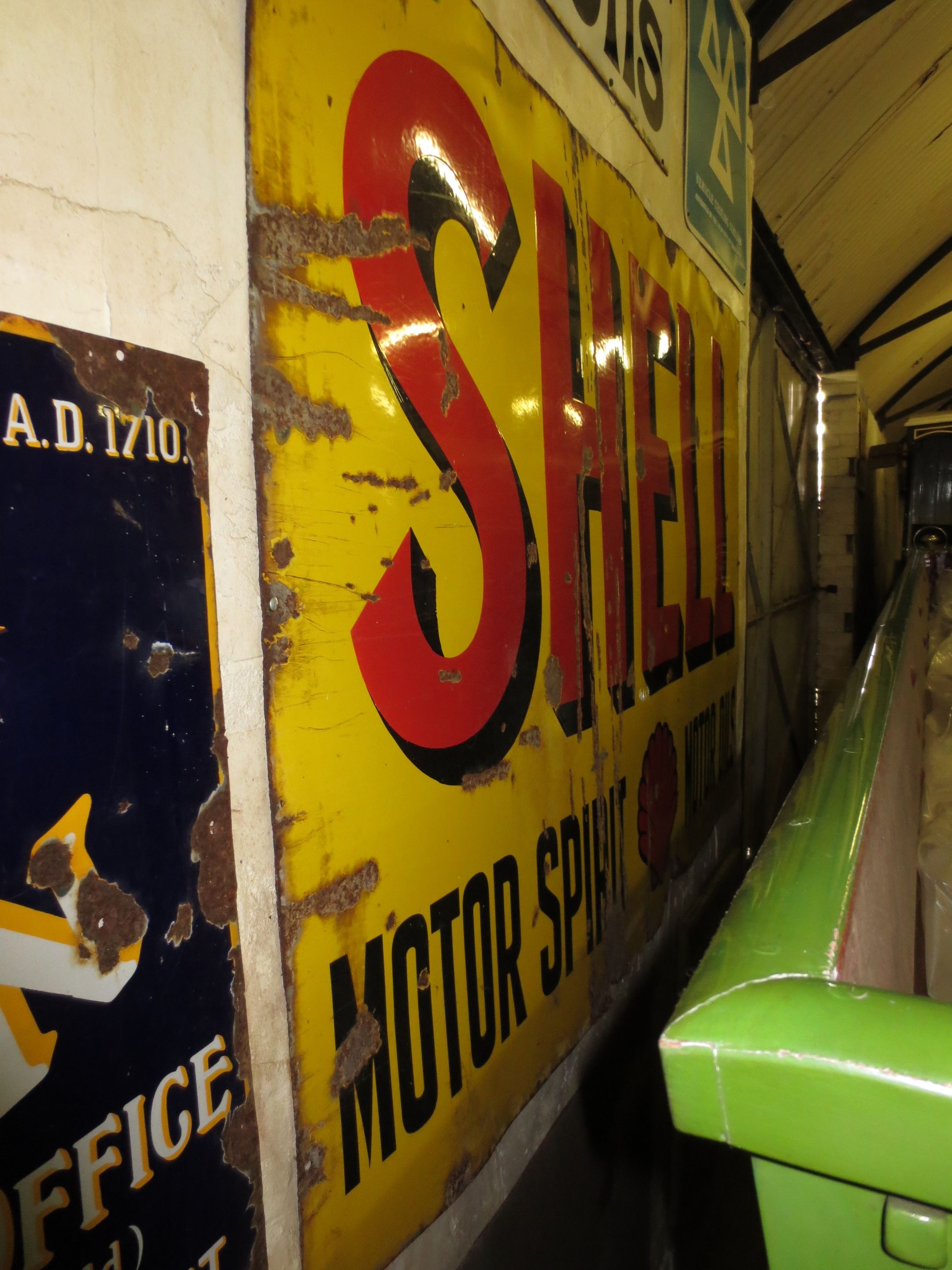 Bonhams Cars : A large Shell Motor Spirit Motor Oils enamel sign,