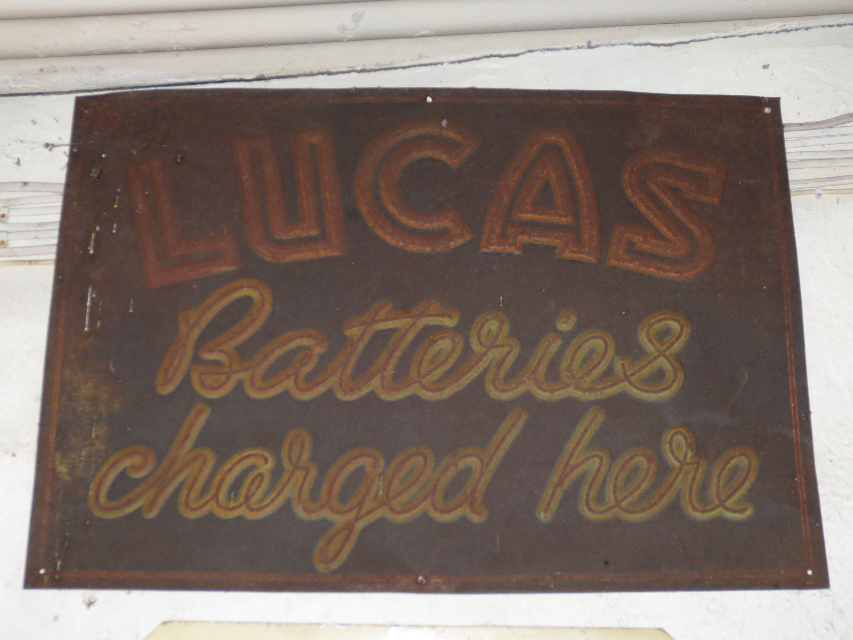 Bonhams Cars : A printed tin Lucas Batteries sign,