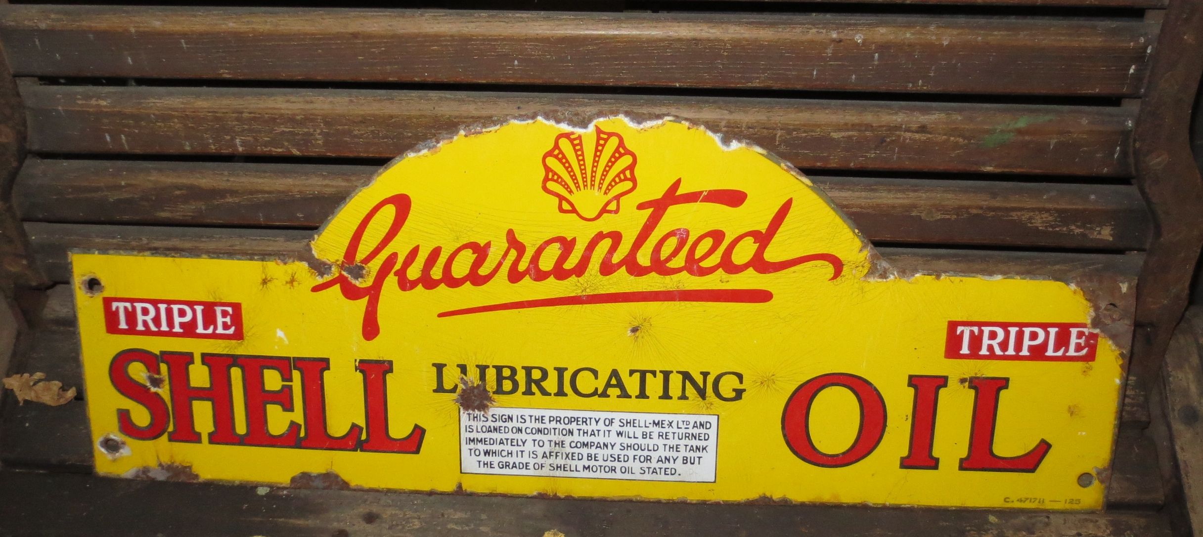 Bonhams Cars : A Guaranteed Shell Oil enamel sign, 1925,