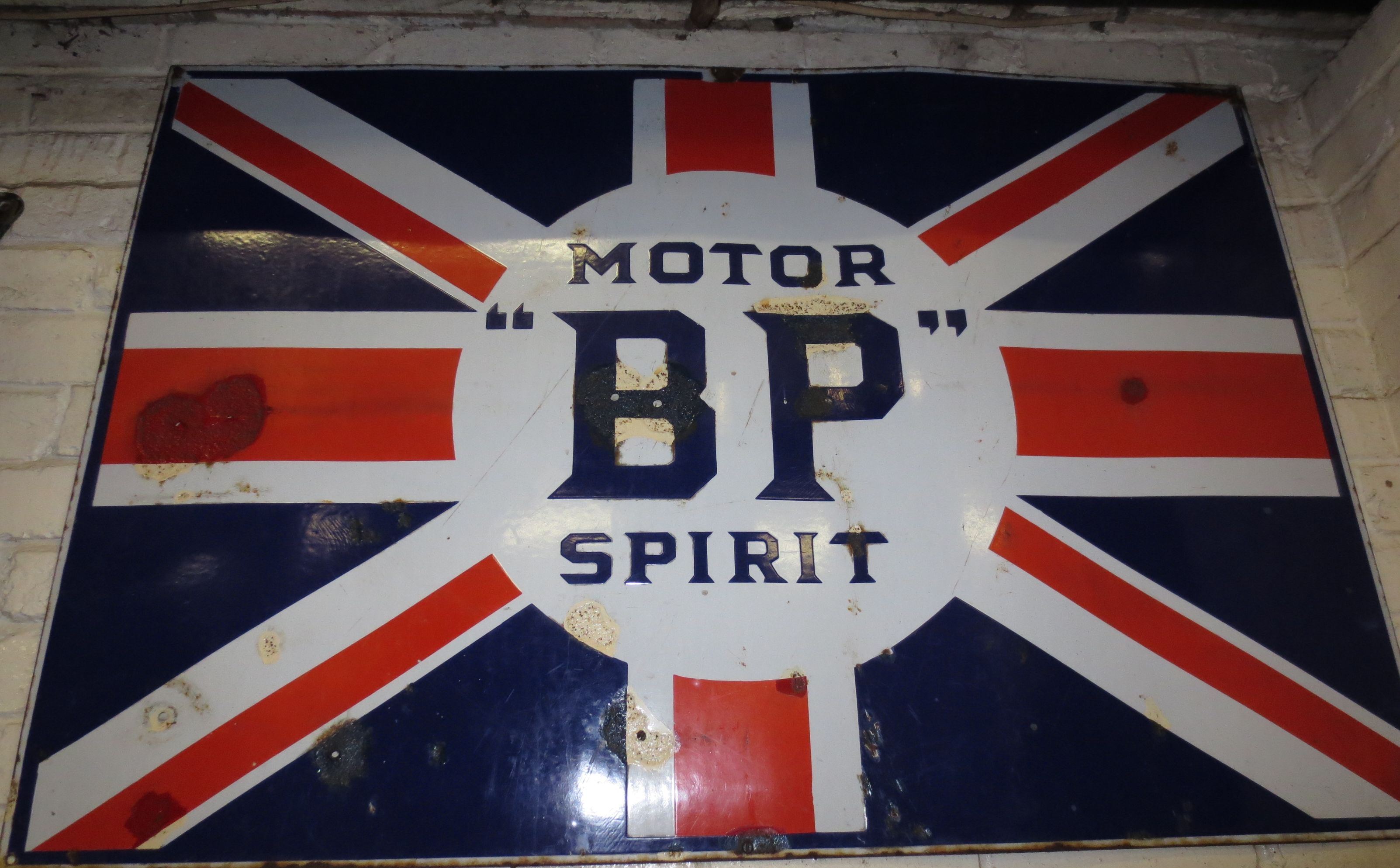 Bonhams Cars : A B.P. Motor Spirit enamel sign,
