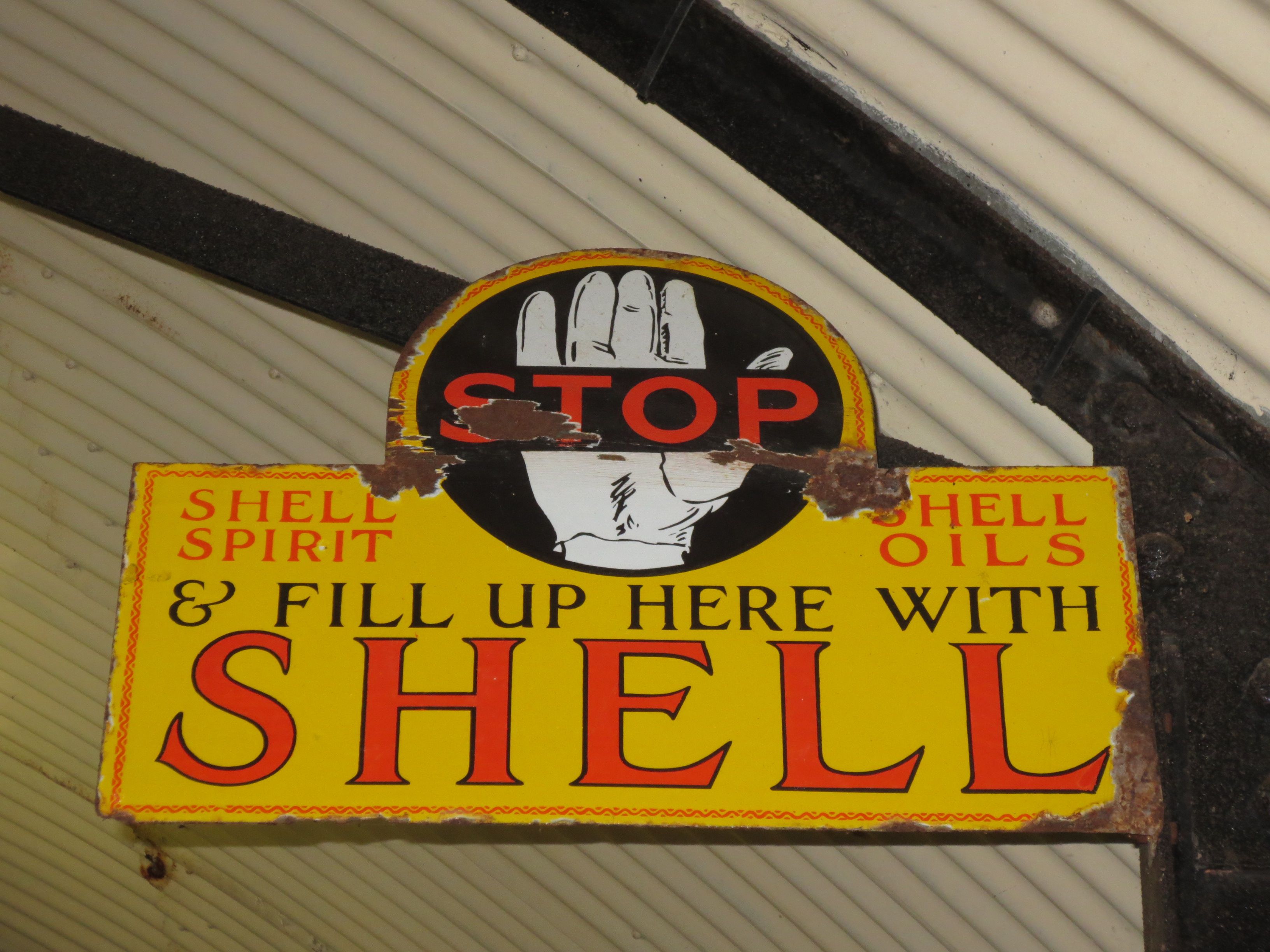 Bonhams Cars : A 'Stop & Fill Up Here with Shell' enamel sign,