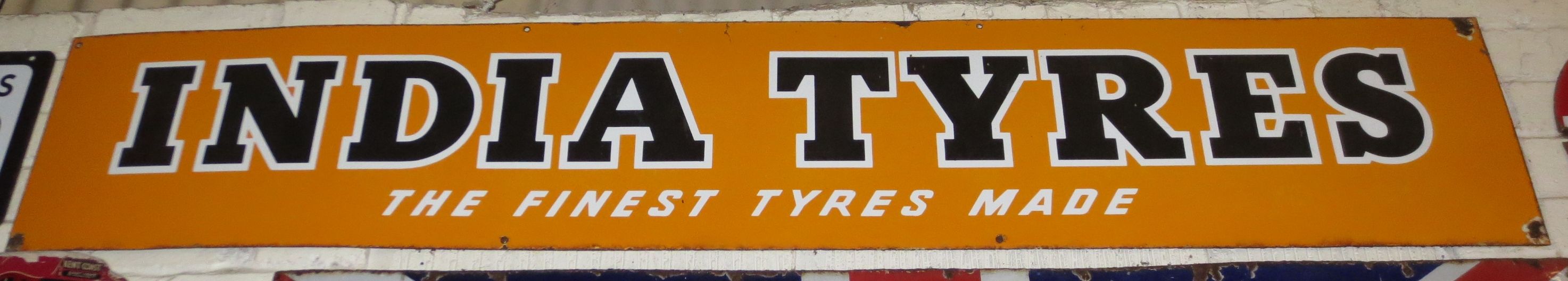 Bonhams Cars : An India Tyres enamel sign,