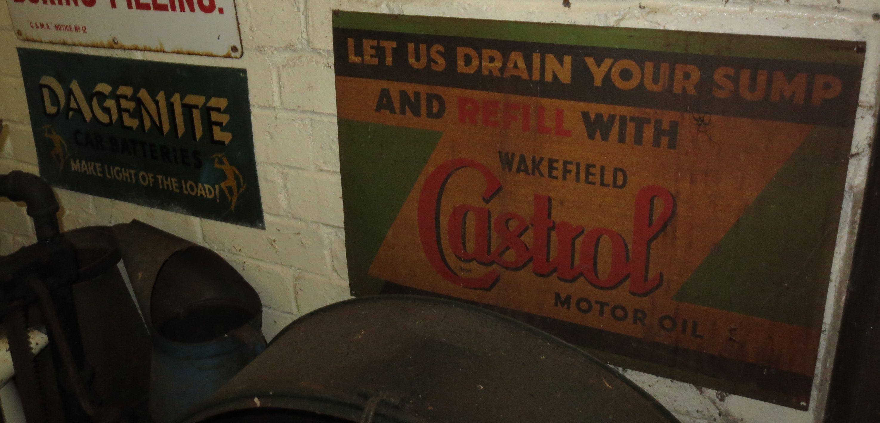 Bonhams Cars : Two printed tin advertising signs for Castrol and Dagenite,