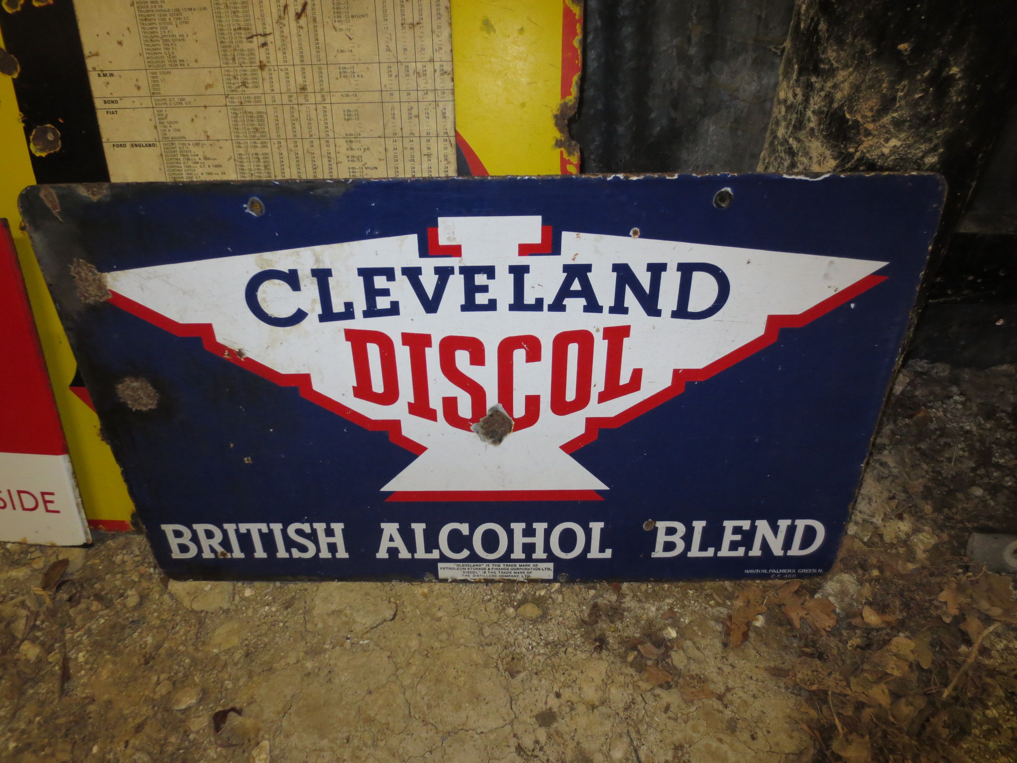 Bonhams Cars : A Cleveland Discol enamel sign,