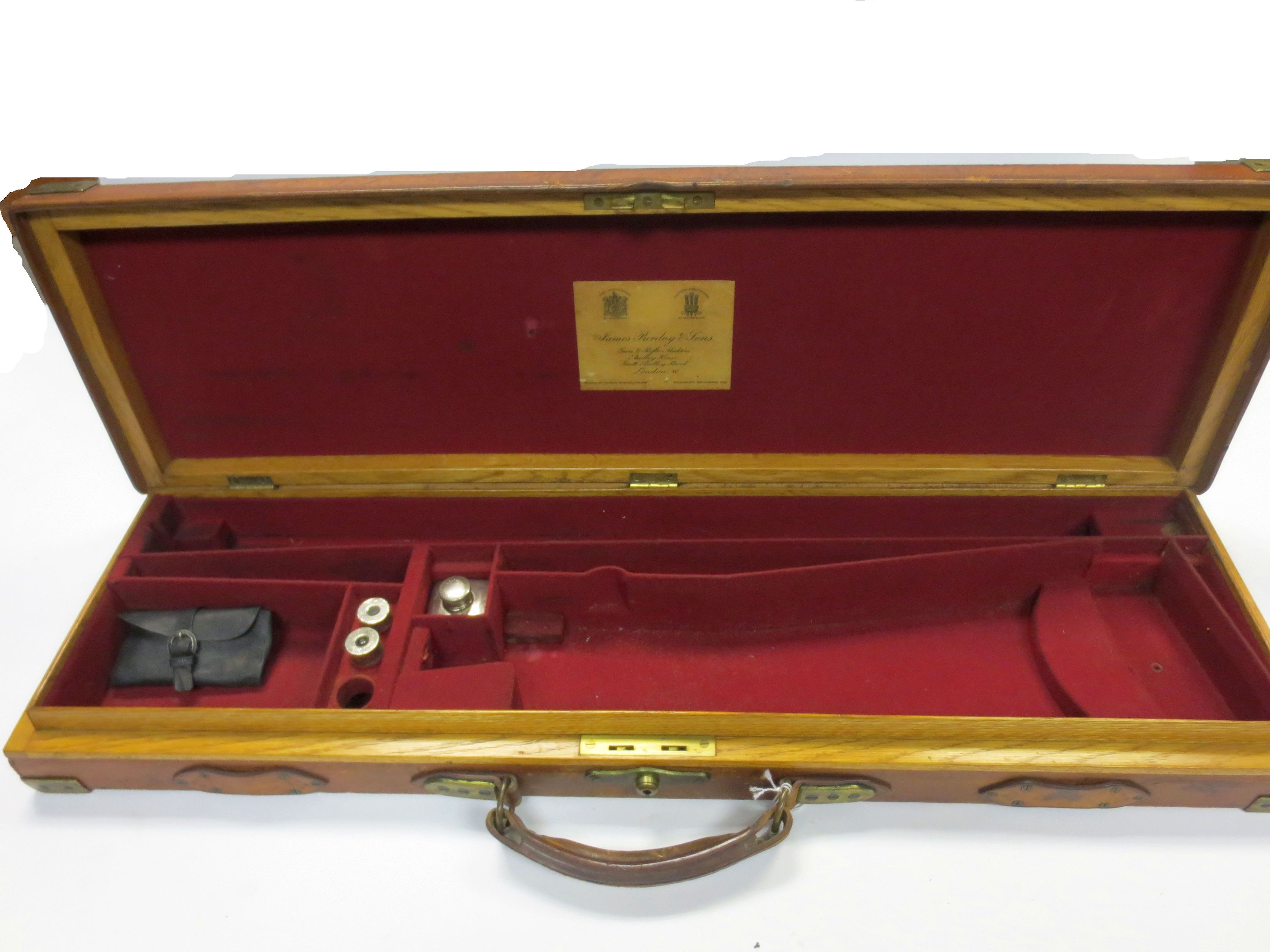 Bonhams : A James Purdey & Sons brass-mounted oak and leather single ...