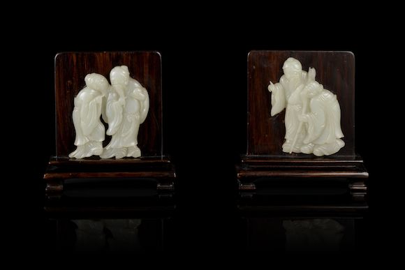 Bonhams : A pair of pale green jade 'two sages' plaques mounted as ...