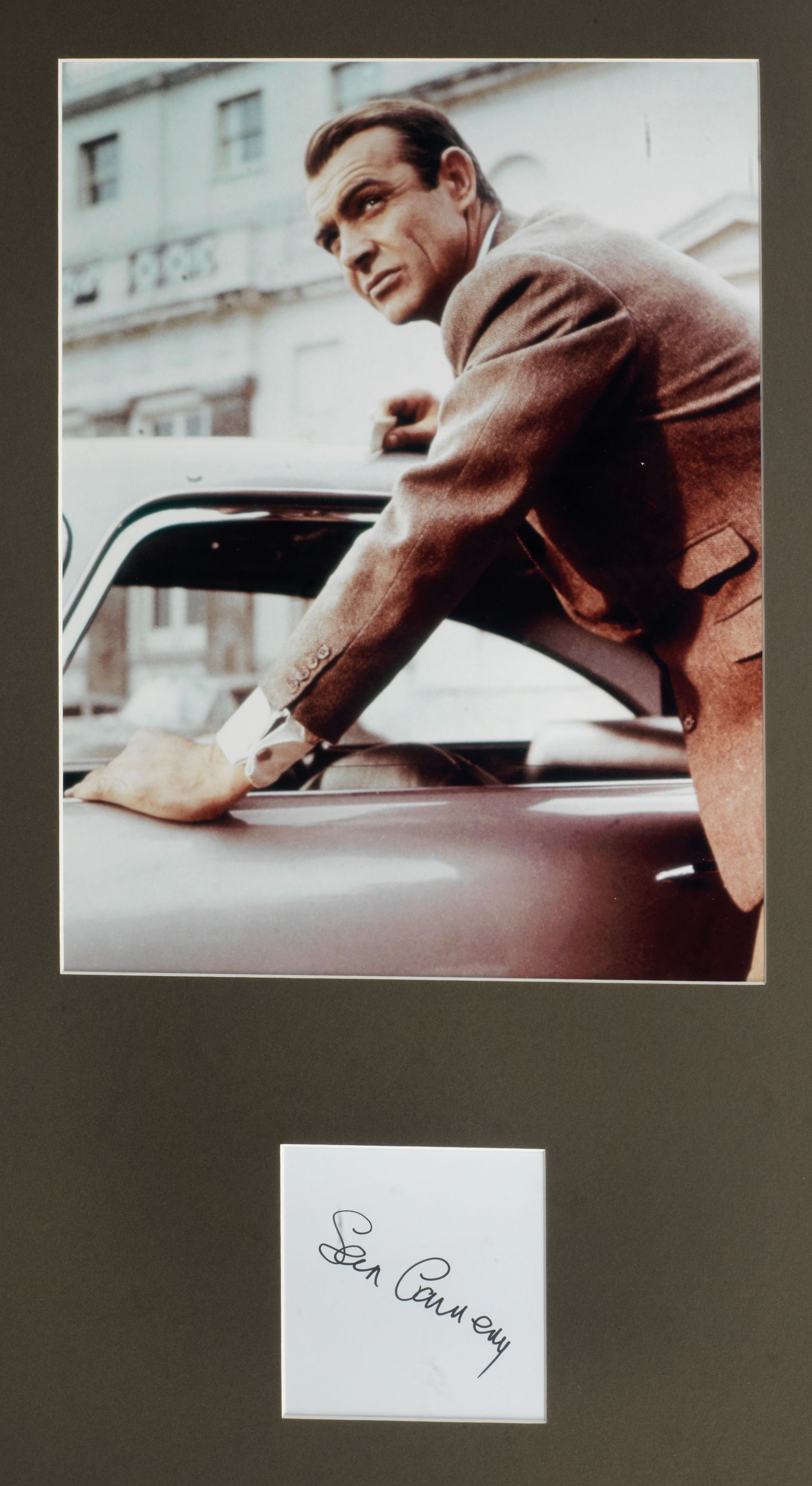 Bonhams Cars : A James Bond 'Goldfinger' framed photograph with signature,