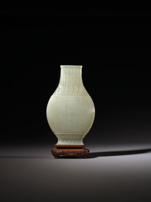Bonhams : A pale green jade Mughal-style oviform flattened vase Mid ...
