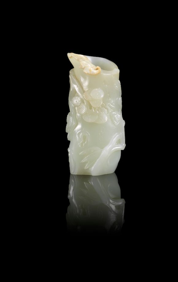Bonhams : A small white jade 'pine and prunus' vase 18th/19th century
