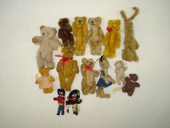 Bonhams : Four miniature Schuco Teddy bears, 1920's lot
