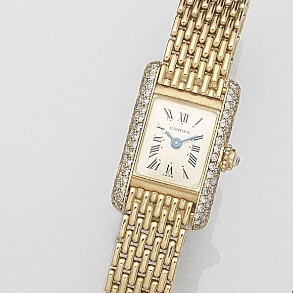 Bonhams : Cartier. A lady's 18ct gold and diamond set quartz bracelet ...