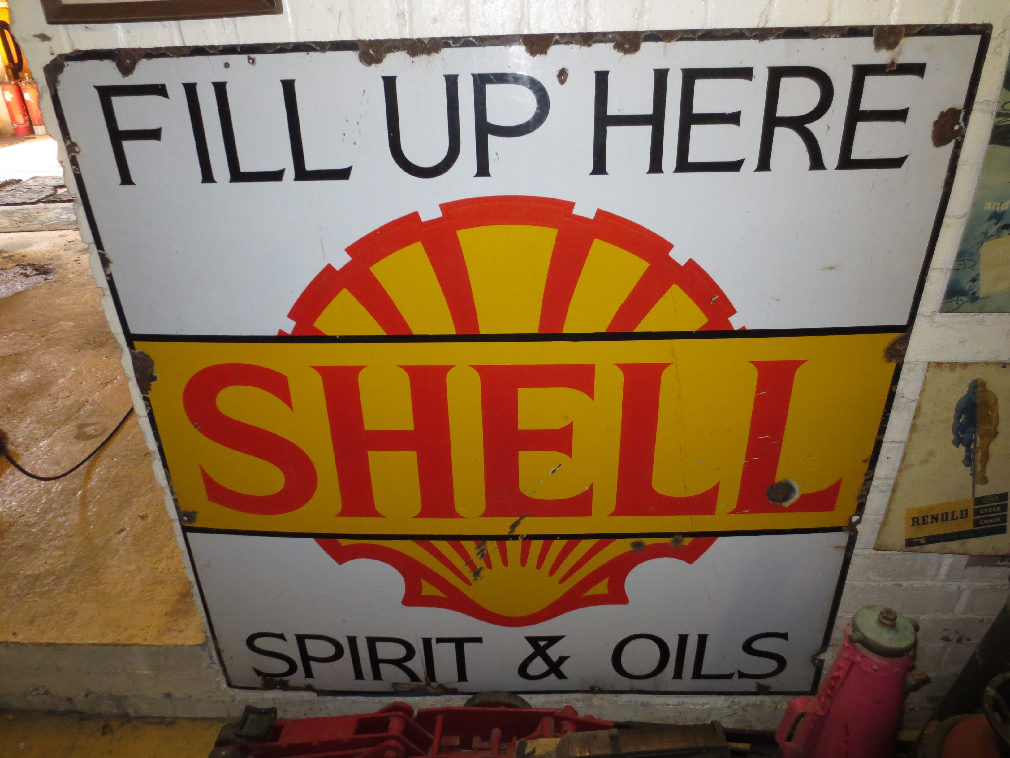 Bonhams Cars : A large Shell 'Fill Up Here Spirit & Oils' enamel sign,