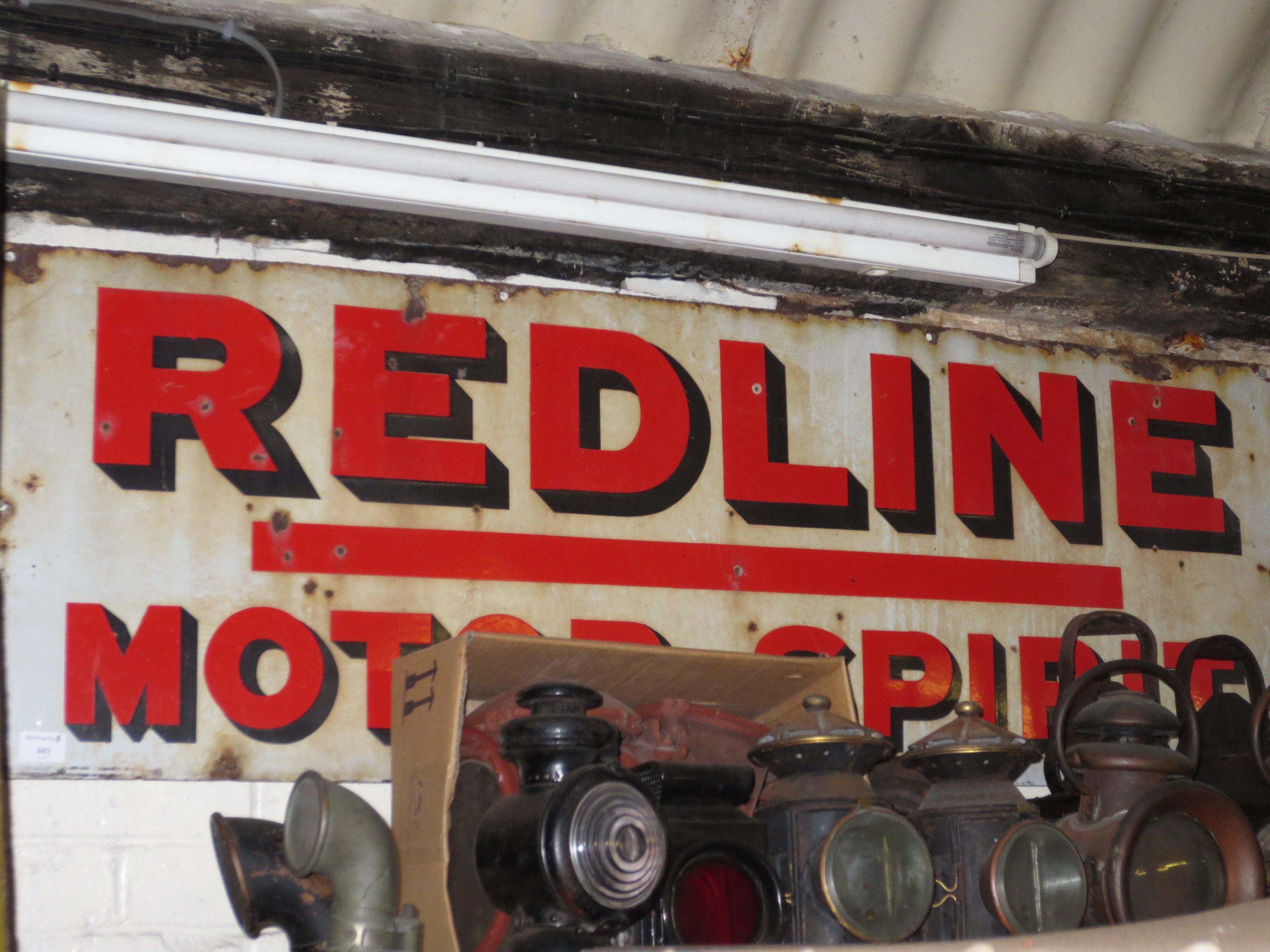 Bonhams Cars : A Redline Motor Spirit enamel sign,