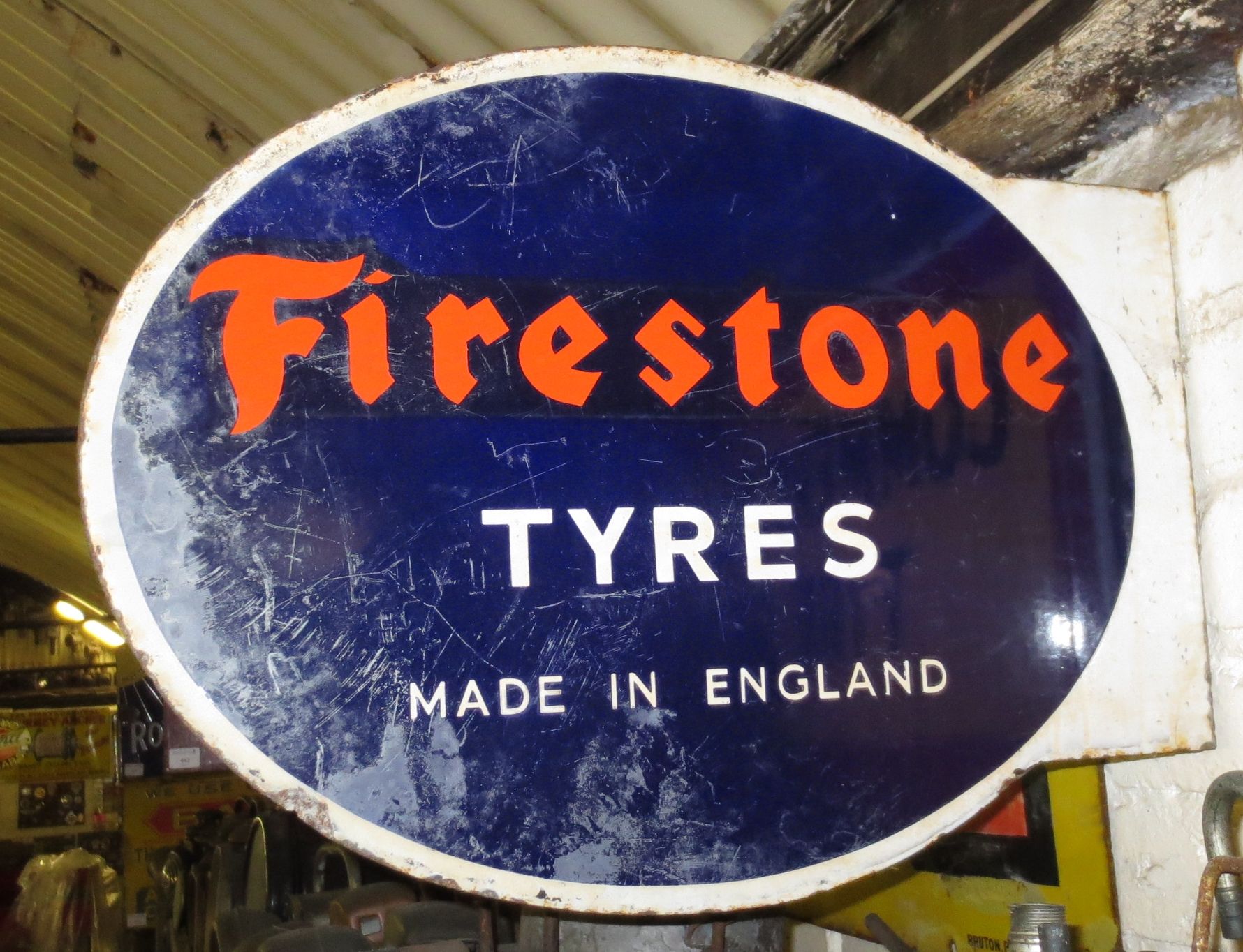 Bonhams Cars : A Firestone Tyres enamel sign,