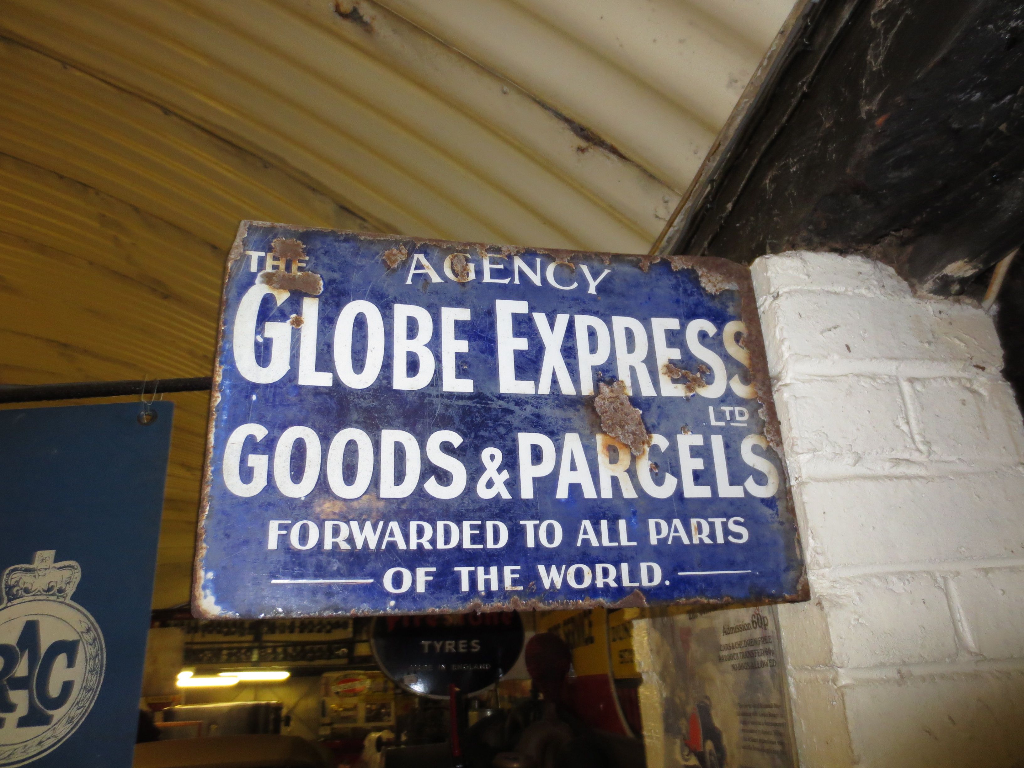 Bonhams Cars : A 'Globe Express Goods & Parcels' enamel sign,