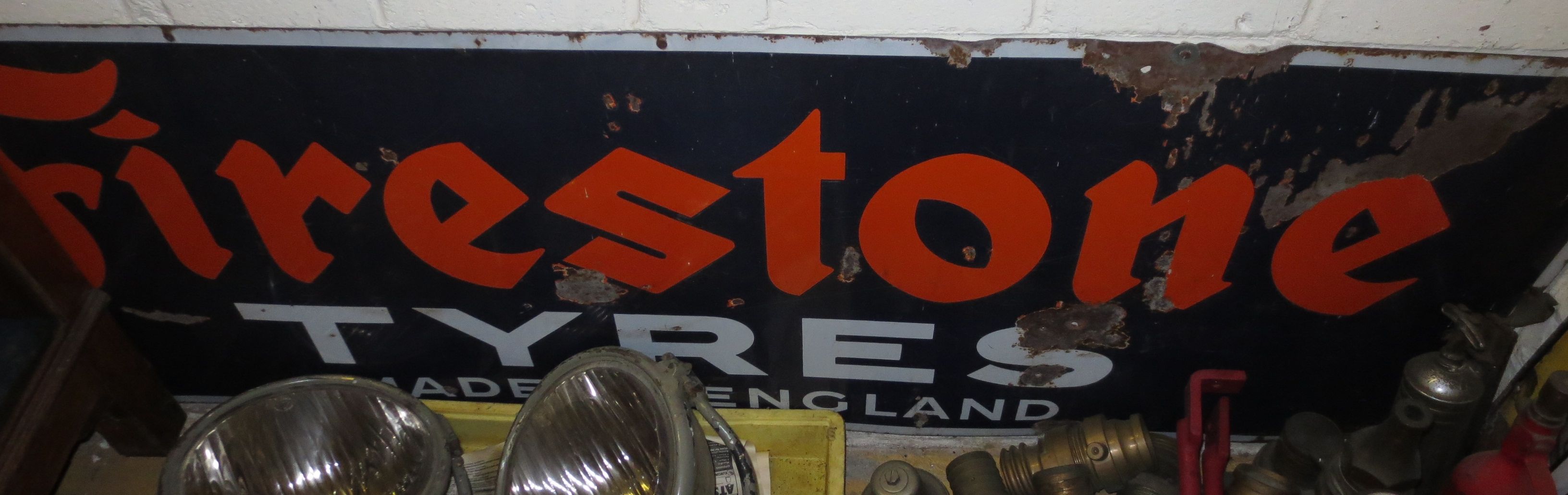 Bonhams Cars : A Firestone Tyres enamel sign,