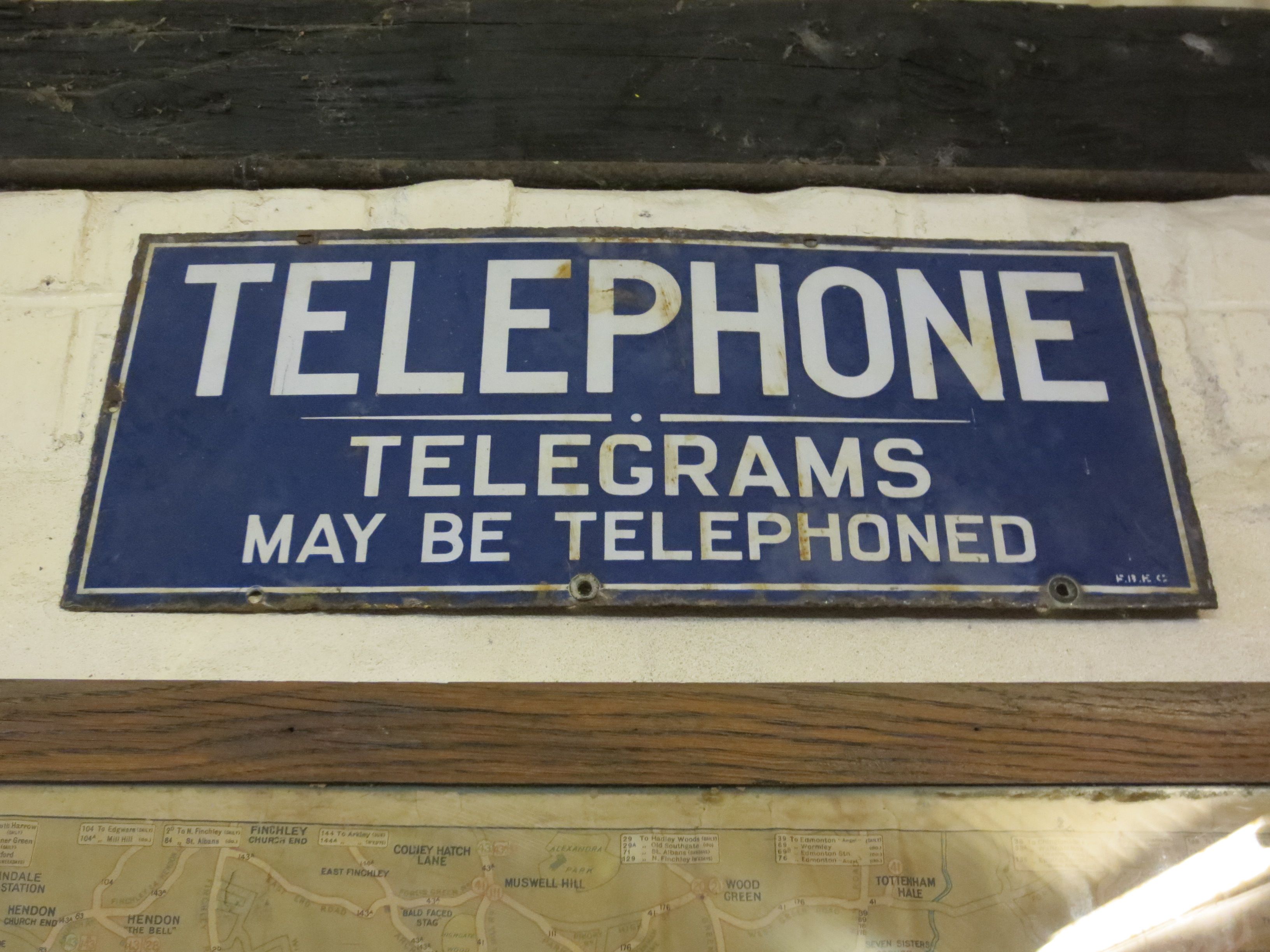 Bonhams Cars : A 'Telephone' enamel sign,