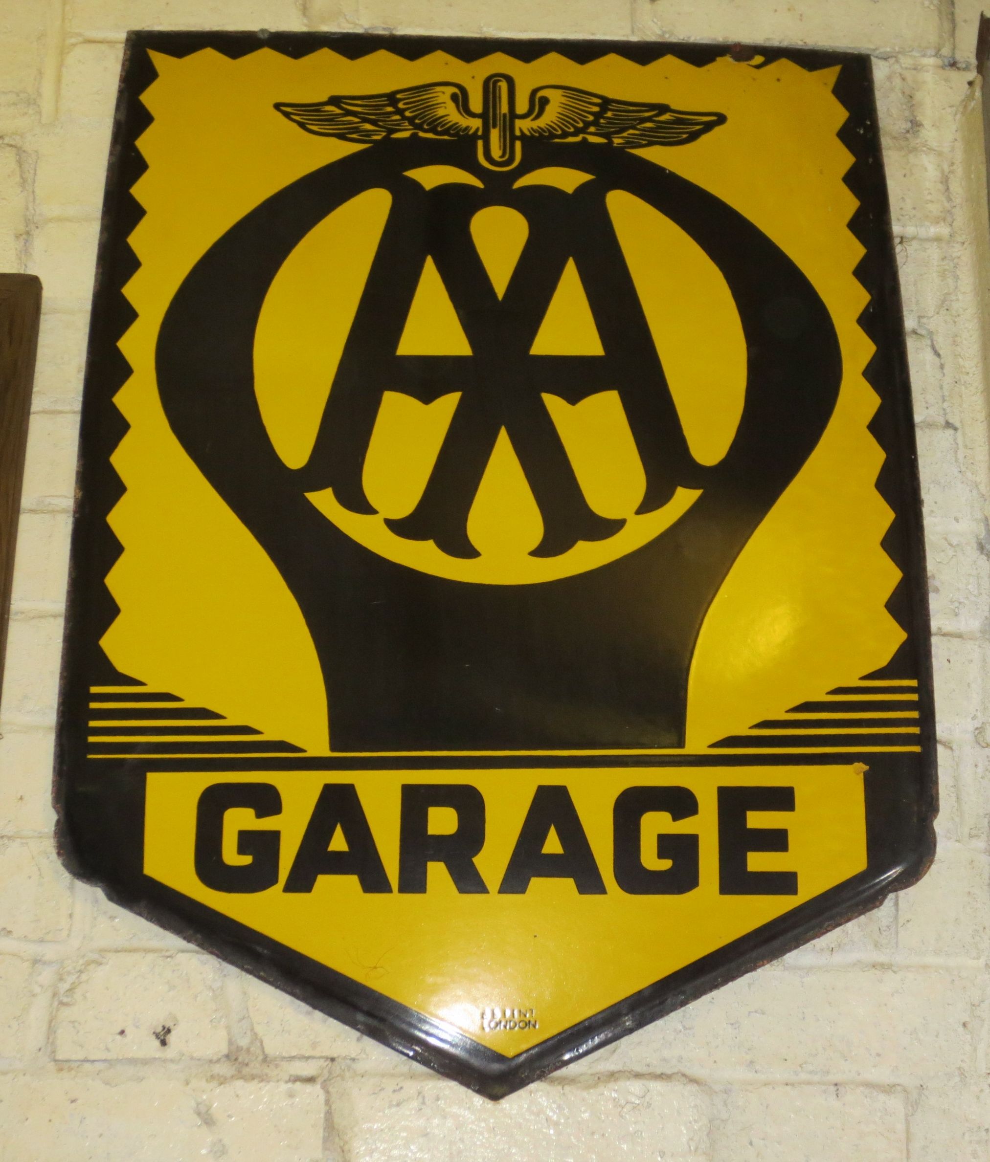 Bonhams Cars : An 'AA Garage' sign by B.B. Kent,