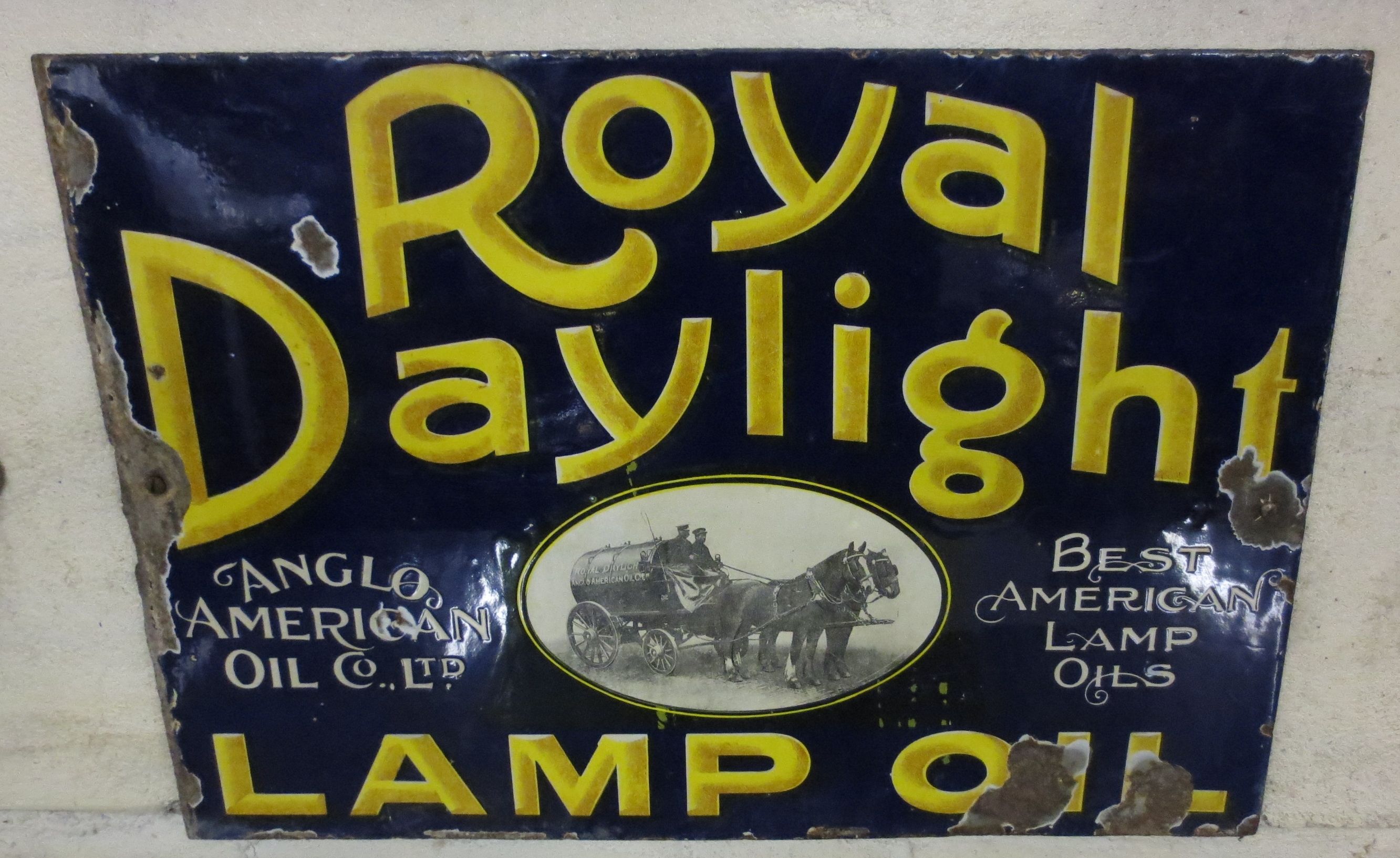 Bonhams Cars : A Royal Daylight Lamp Oil enamel sign,
