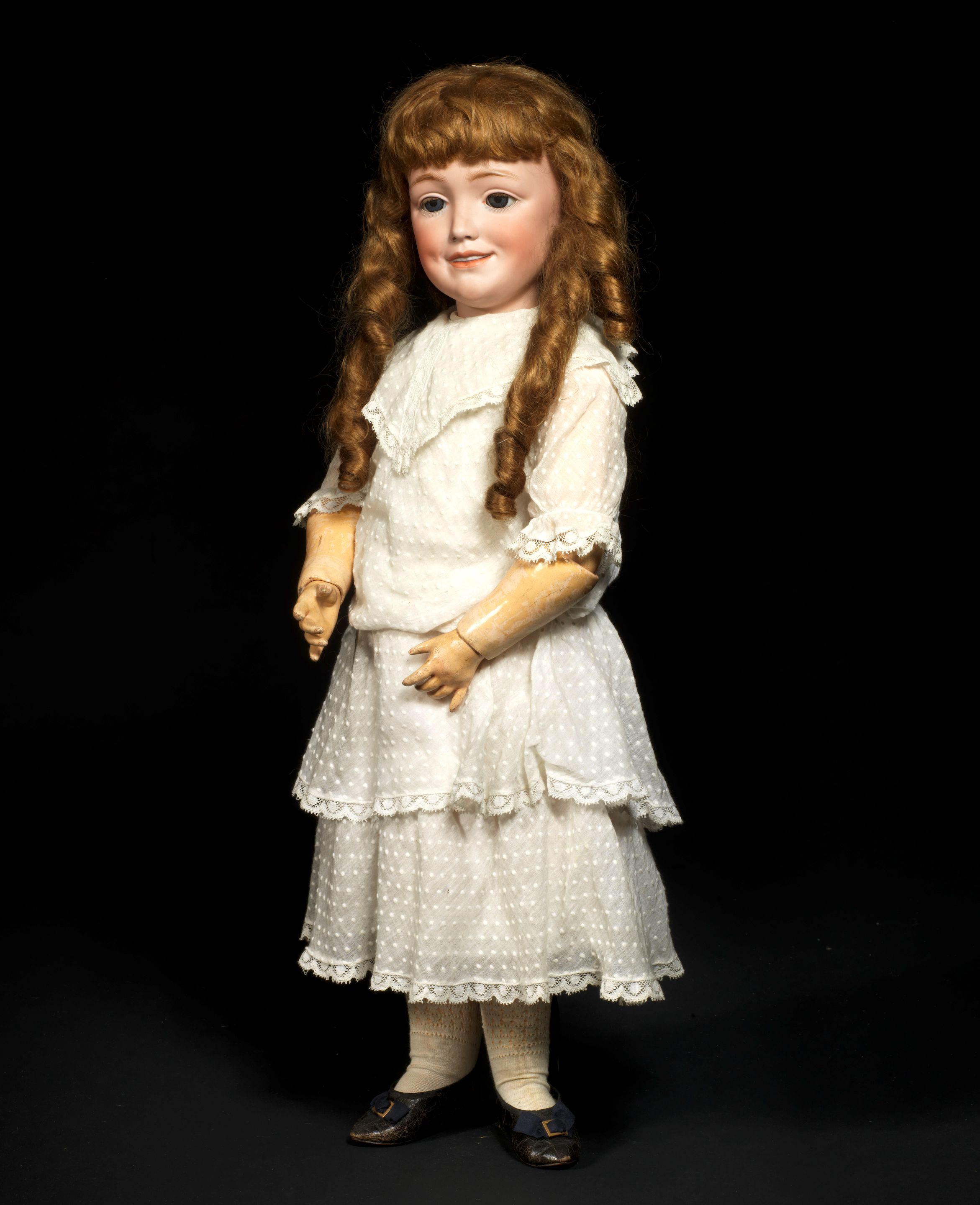 Bonhams : A rare Simon & Halbig 1388 bisque head smiling character doll