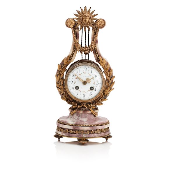 Bonhams : An early 20th century gilt-metal and marble lyre-shaped clock ...