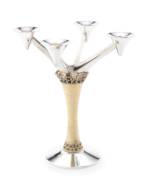 Bonhams : STUART DEVLIN: A silver and silver-gilt four-light ...