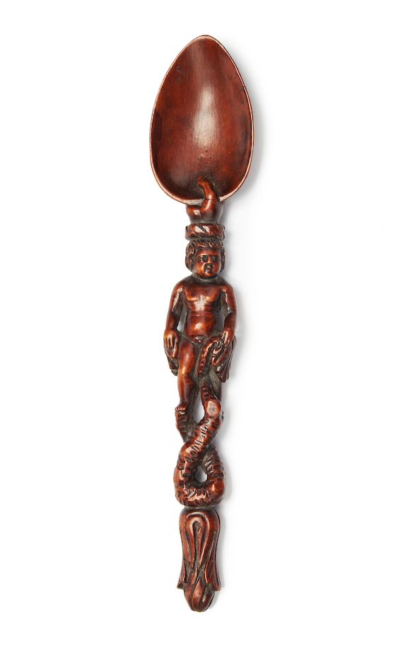 Bonhams : A 17th century carved pearwood spoon, Italian