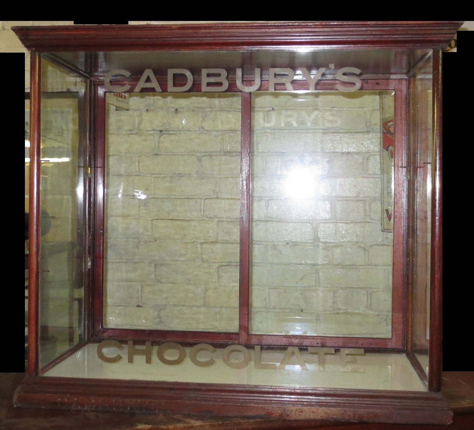 Bonhams Cars : A Cadbury's Chocolate shop counter display cabinet,