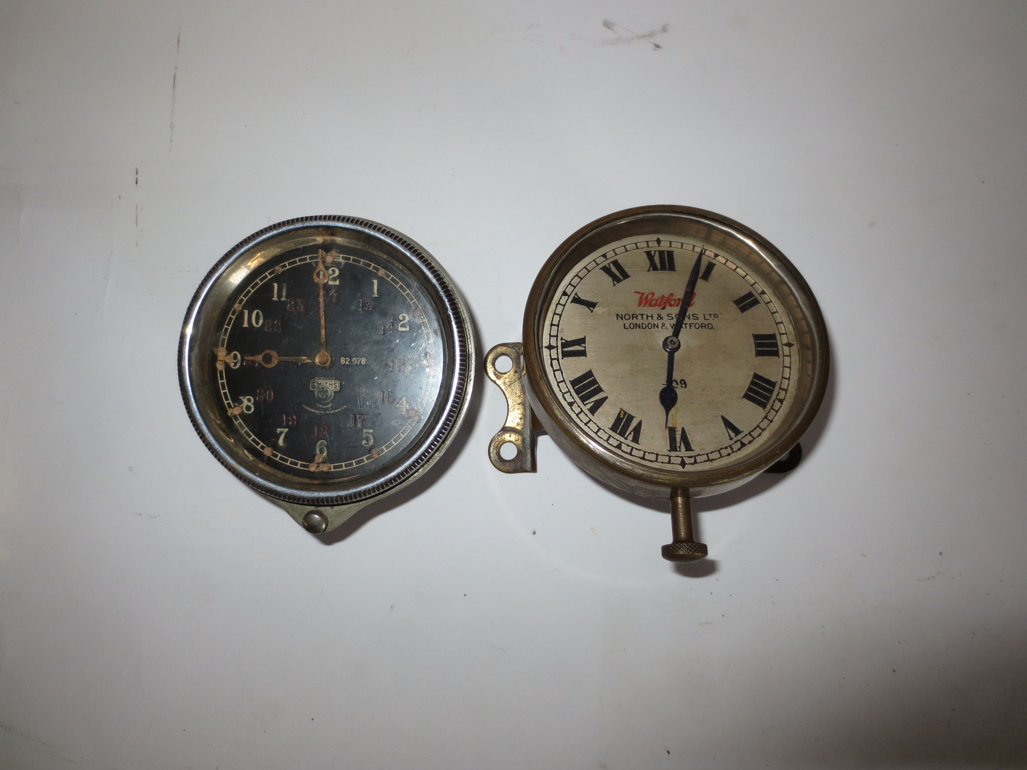Bonhams Cars : Two car clocks,
