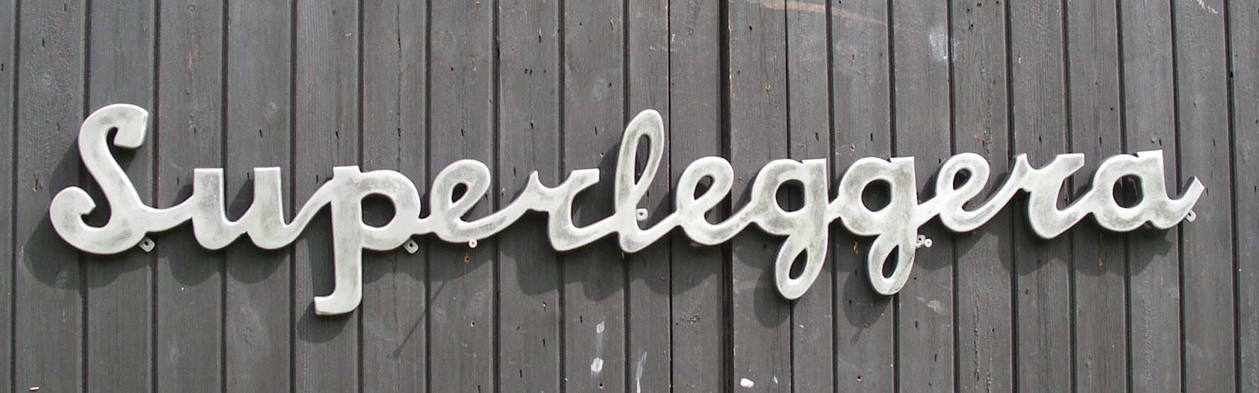Bonhams Cars : A 'Superleggera' garage display emblem,