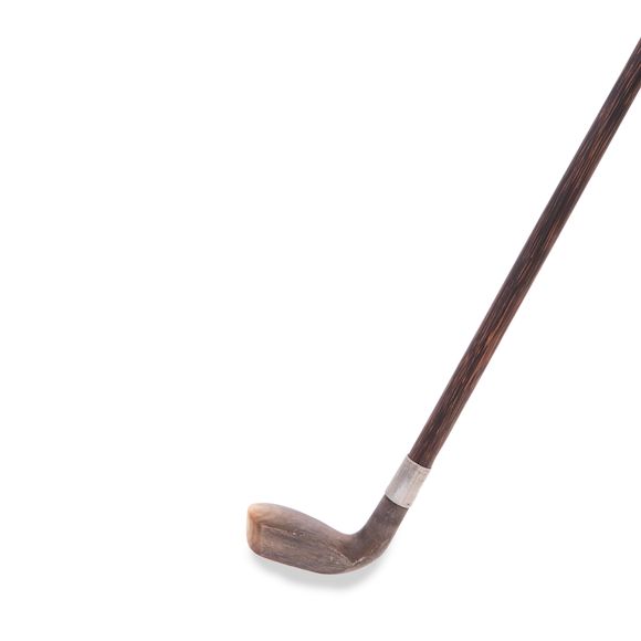 Bonhams : A Sunday Club in the shape of a bulger shaped golf club