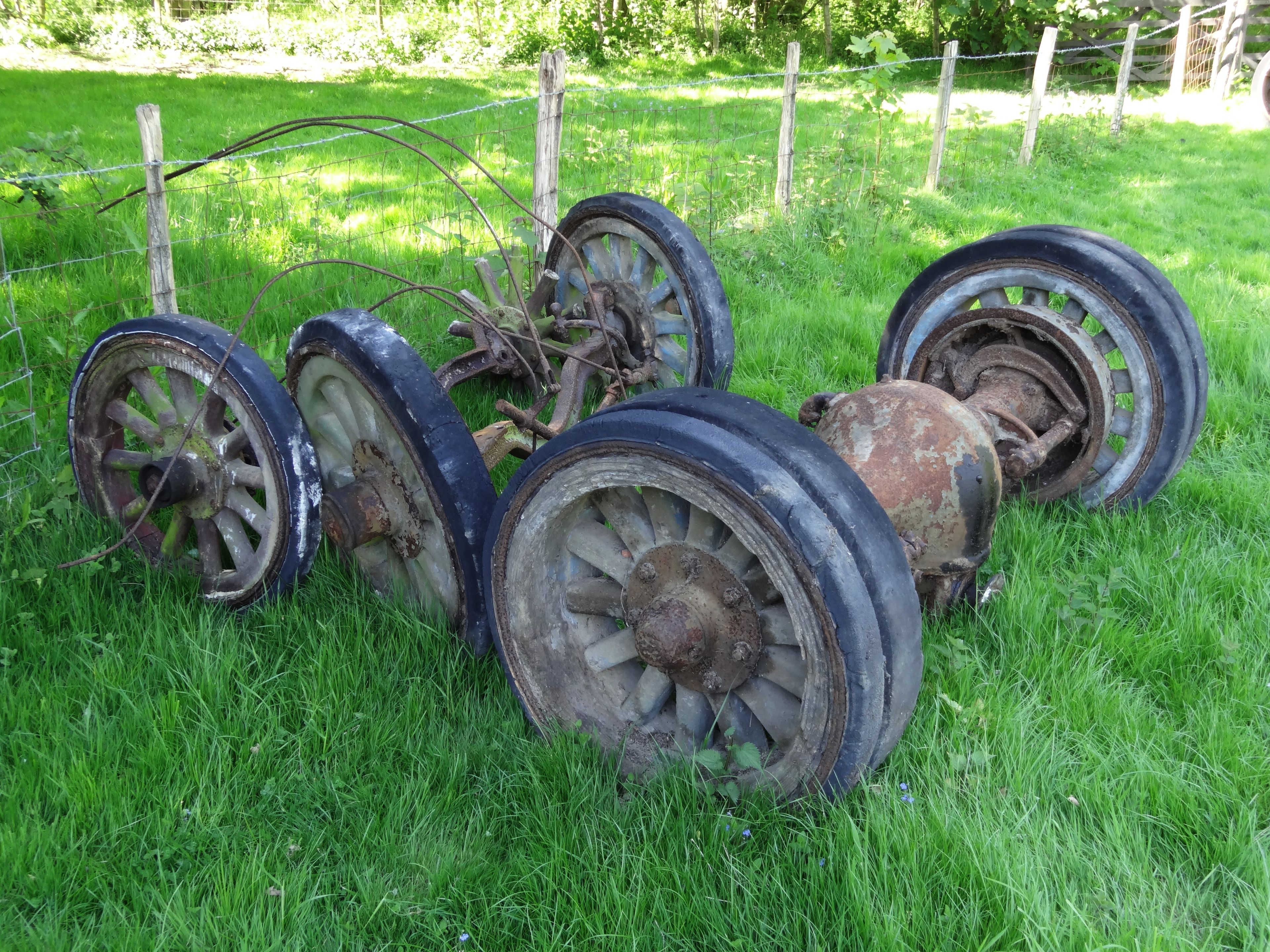 Bonhams Cars : A rear double wooden-wheeled axle, and two identical ...
