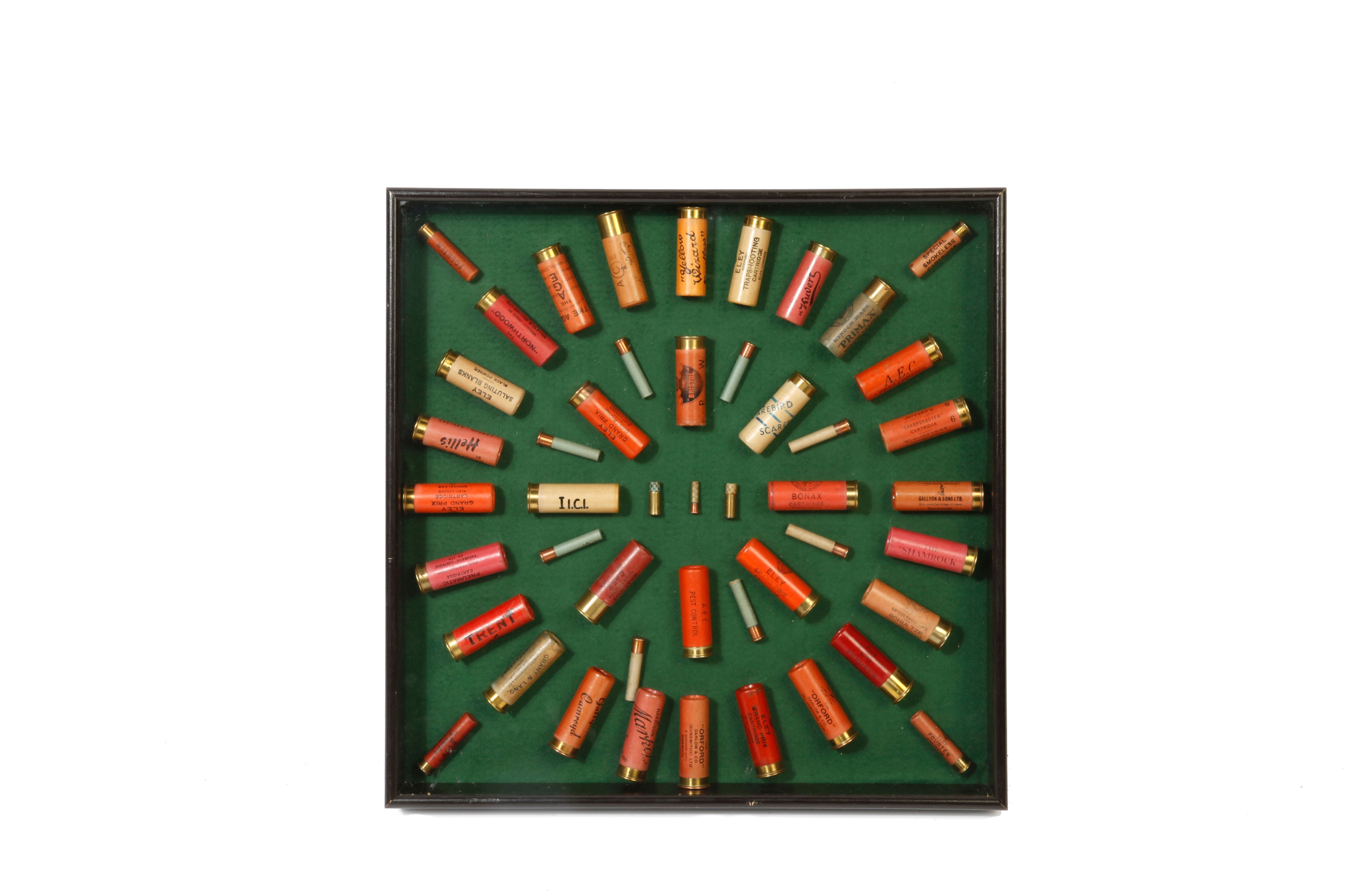 Bonhams Cars : A good framed display of shotgun shells,