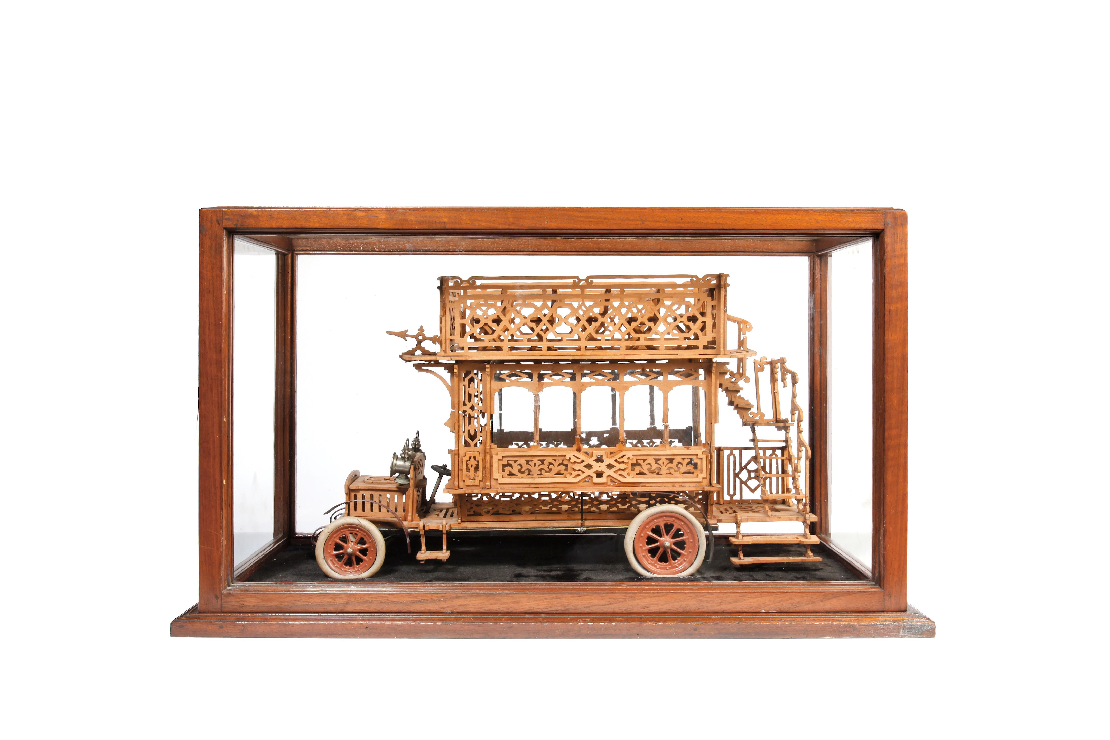 Bonhams Cars : A fine wooden fretwork model of an Omnibus,