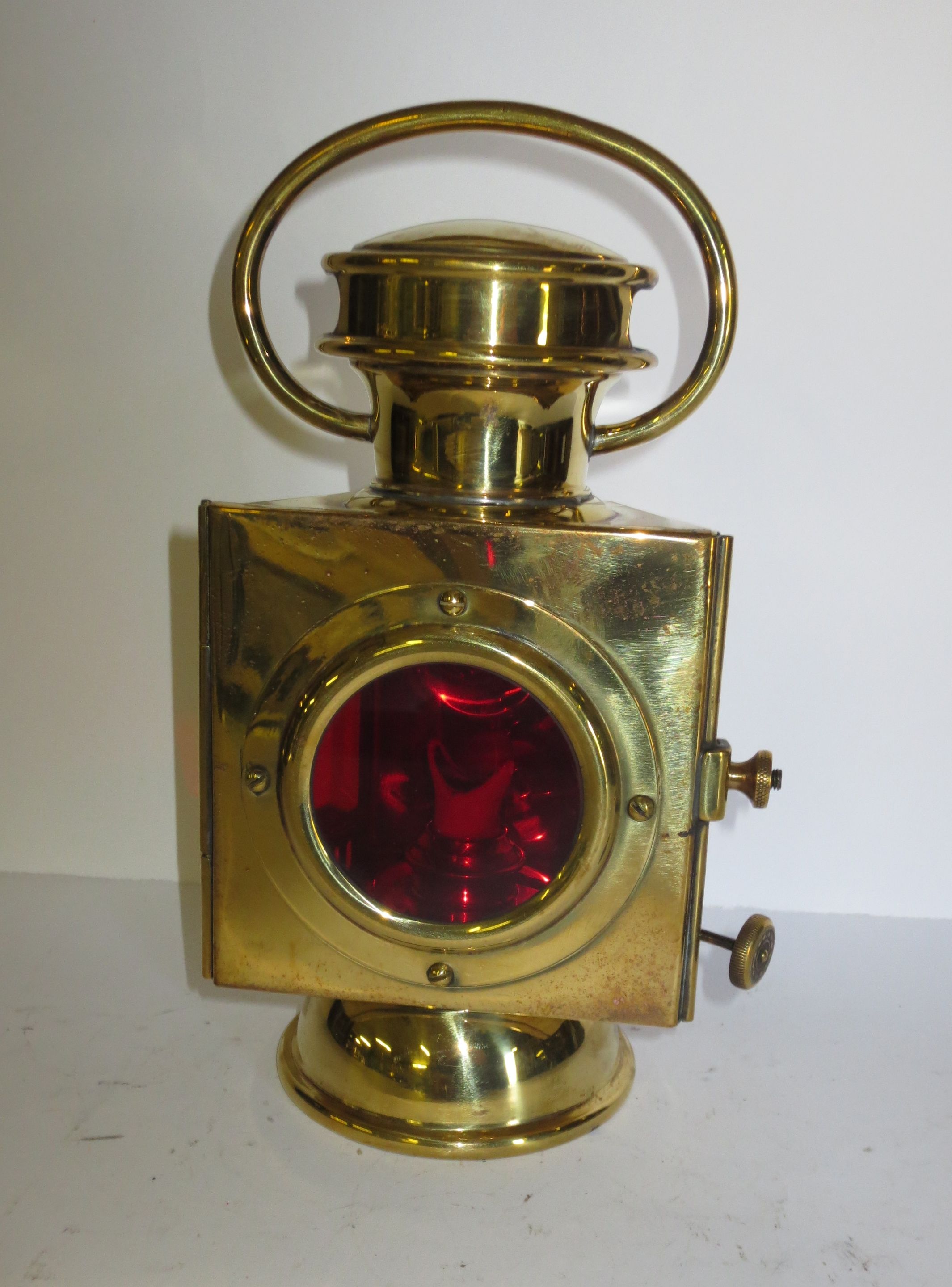 Bonhams Cars : An oil illuminated tail lamp,