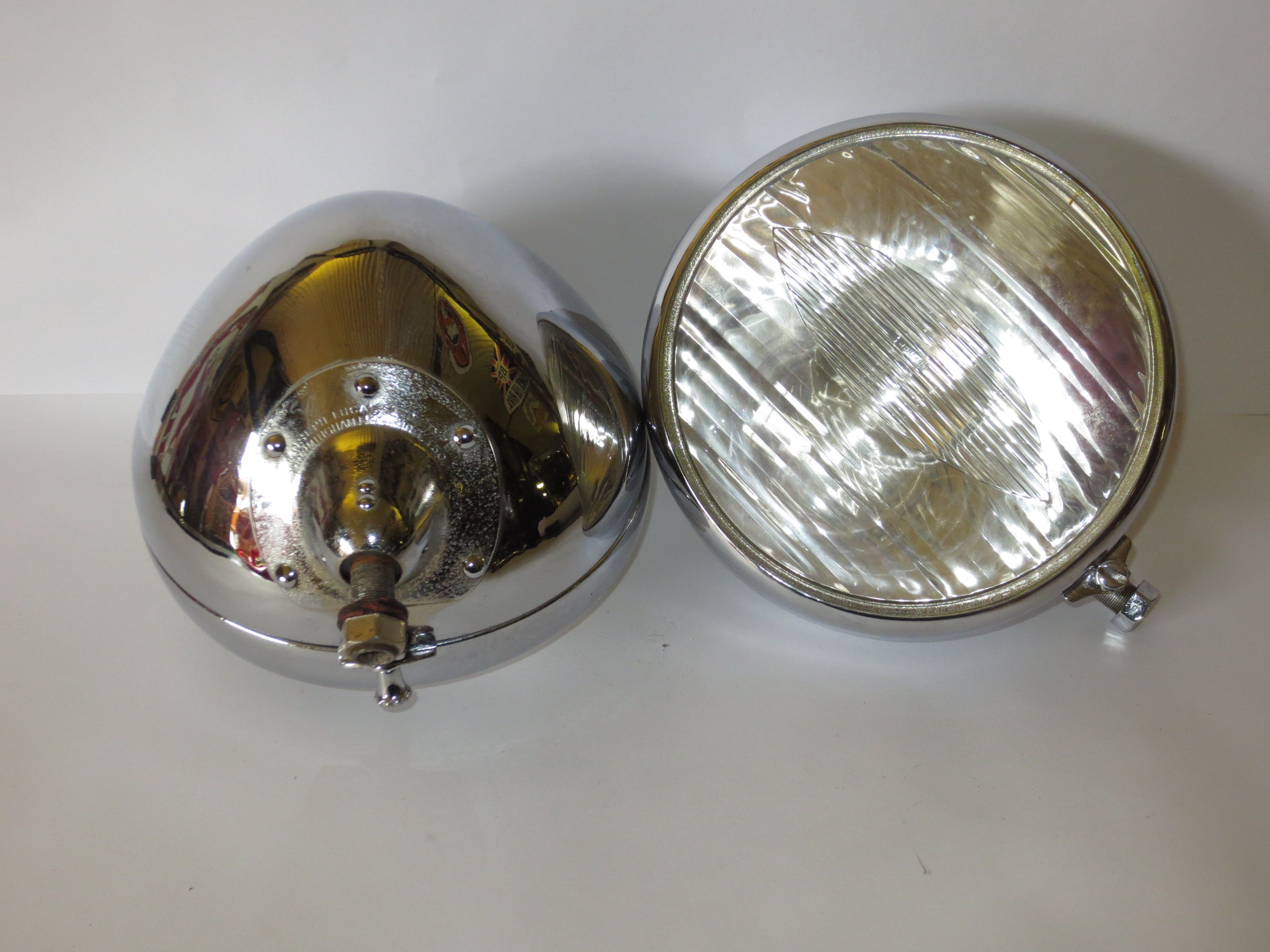 Bonhams Cars : A pair of Lucas Model L150 electric head lamps,