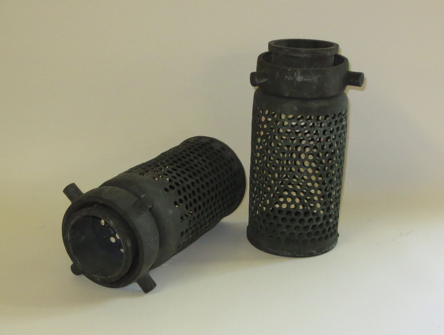 Bonhams Cars : A pair of perforated water strainers,