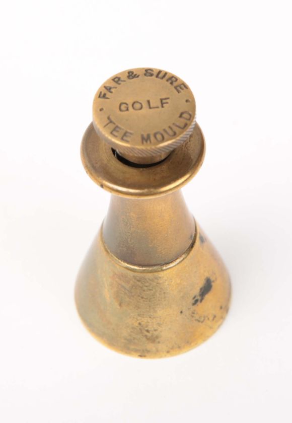 Bonhams : A tall brass Ransomes 'Far and Sure' golf tee mould circa 1880s