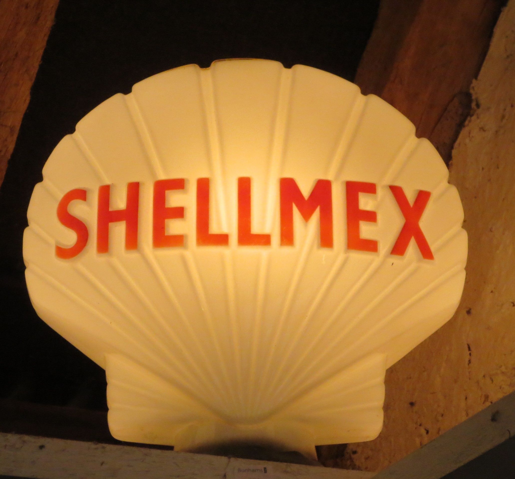 Bonhams Cars : A Shellmex glass petrol pump globe,