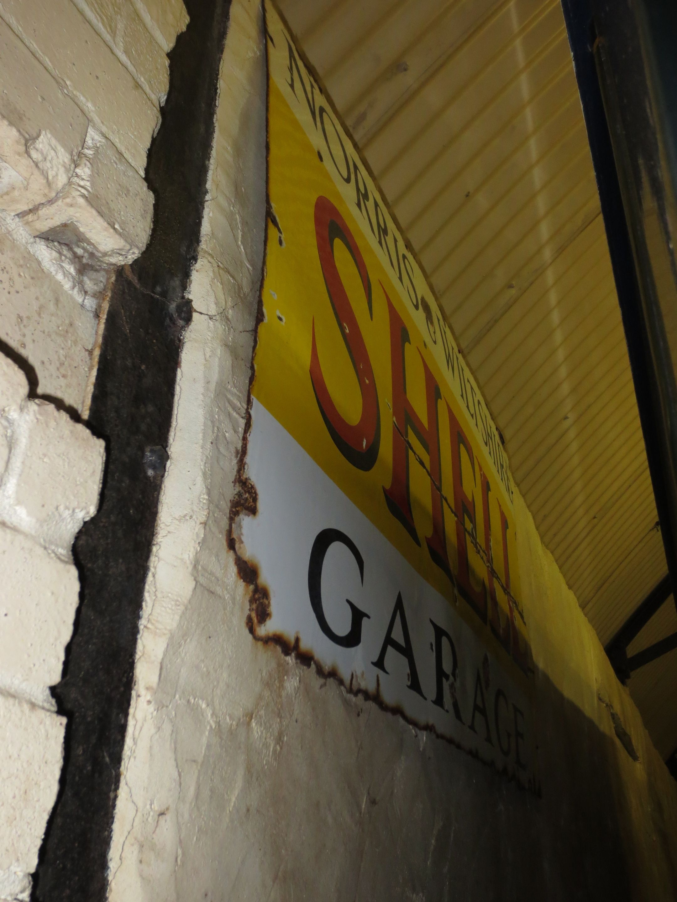 Bonhams Cars : A Shell Garage enamel sign,