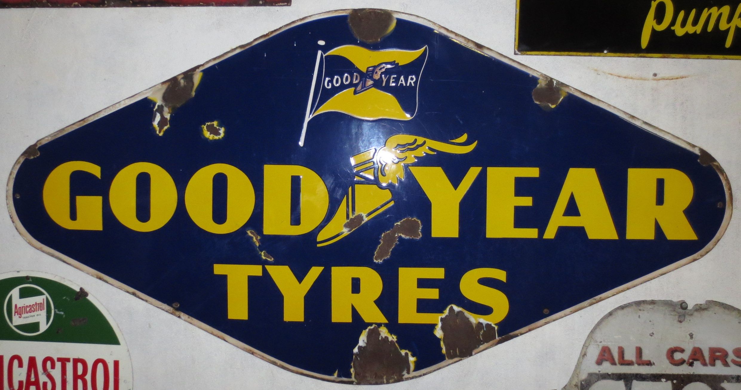 Bonhams Cars : A Goodyear Tyres enamel sign,