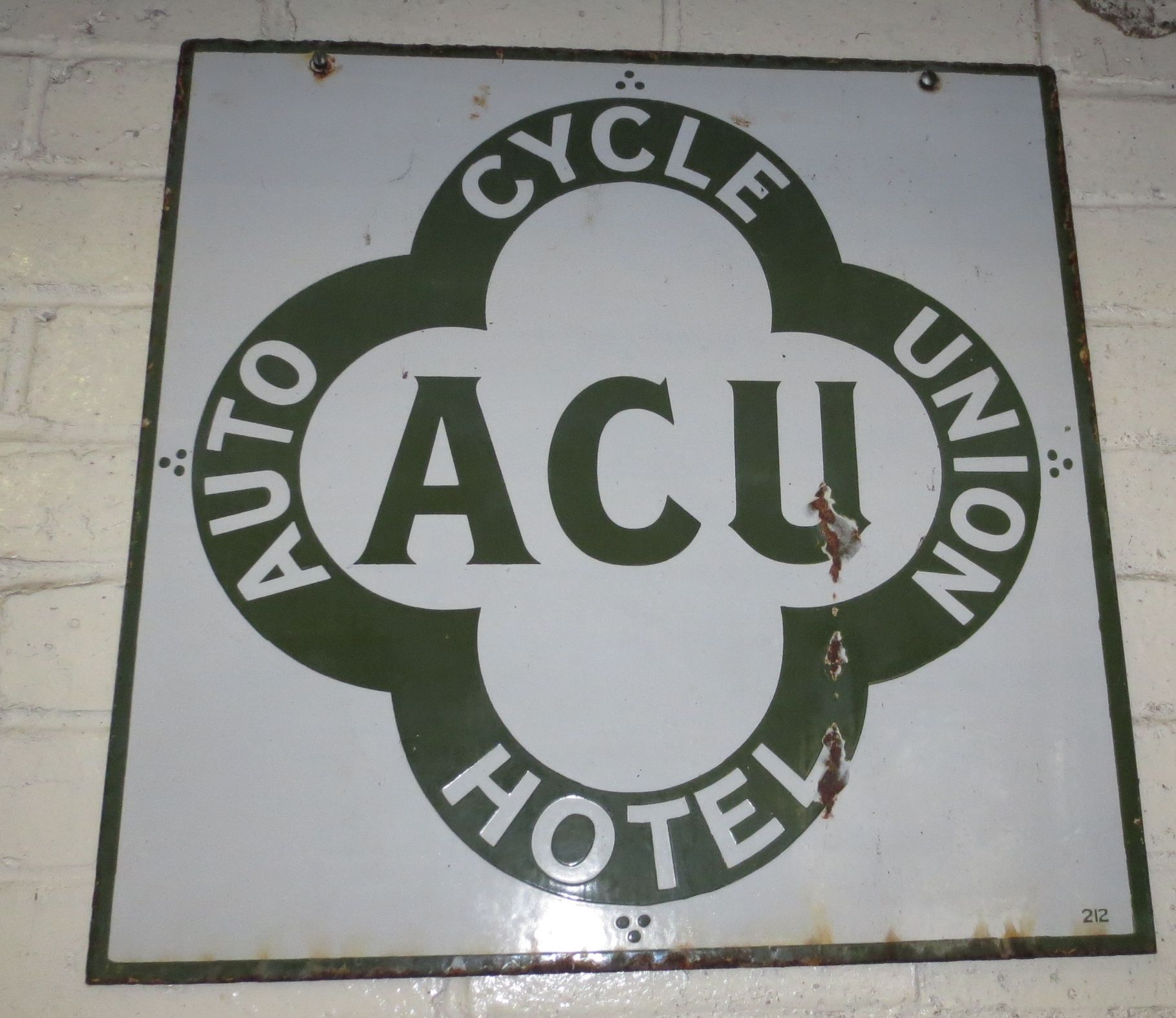 Bonhams Cars : An Auto Cycle Union Hotel enamel sign,
