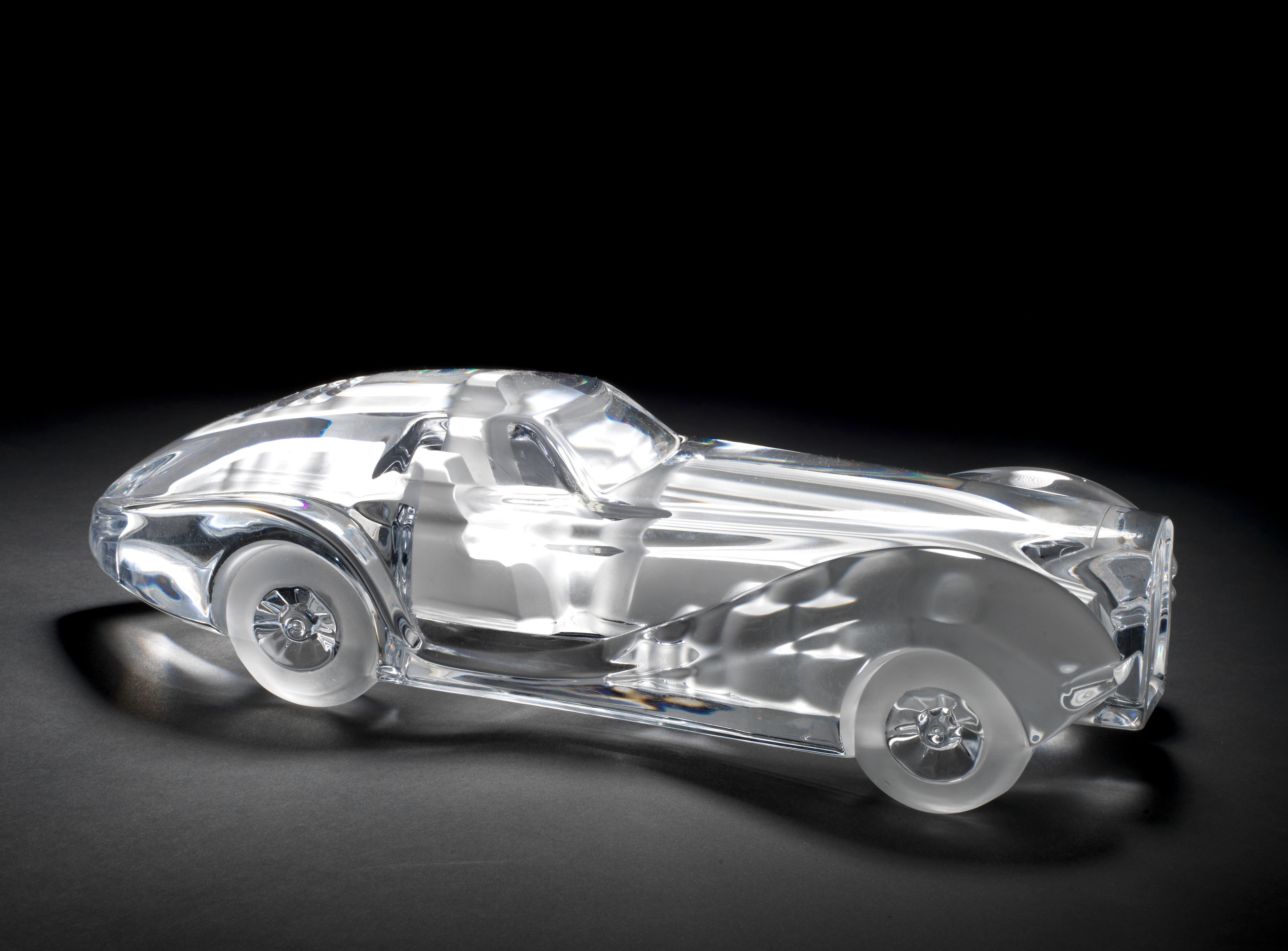Bonhams Cars : A crystal glass 'Riviera Coupé' deskpiece by Daum, French,