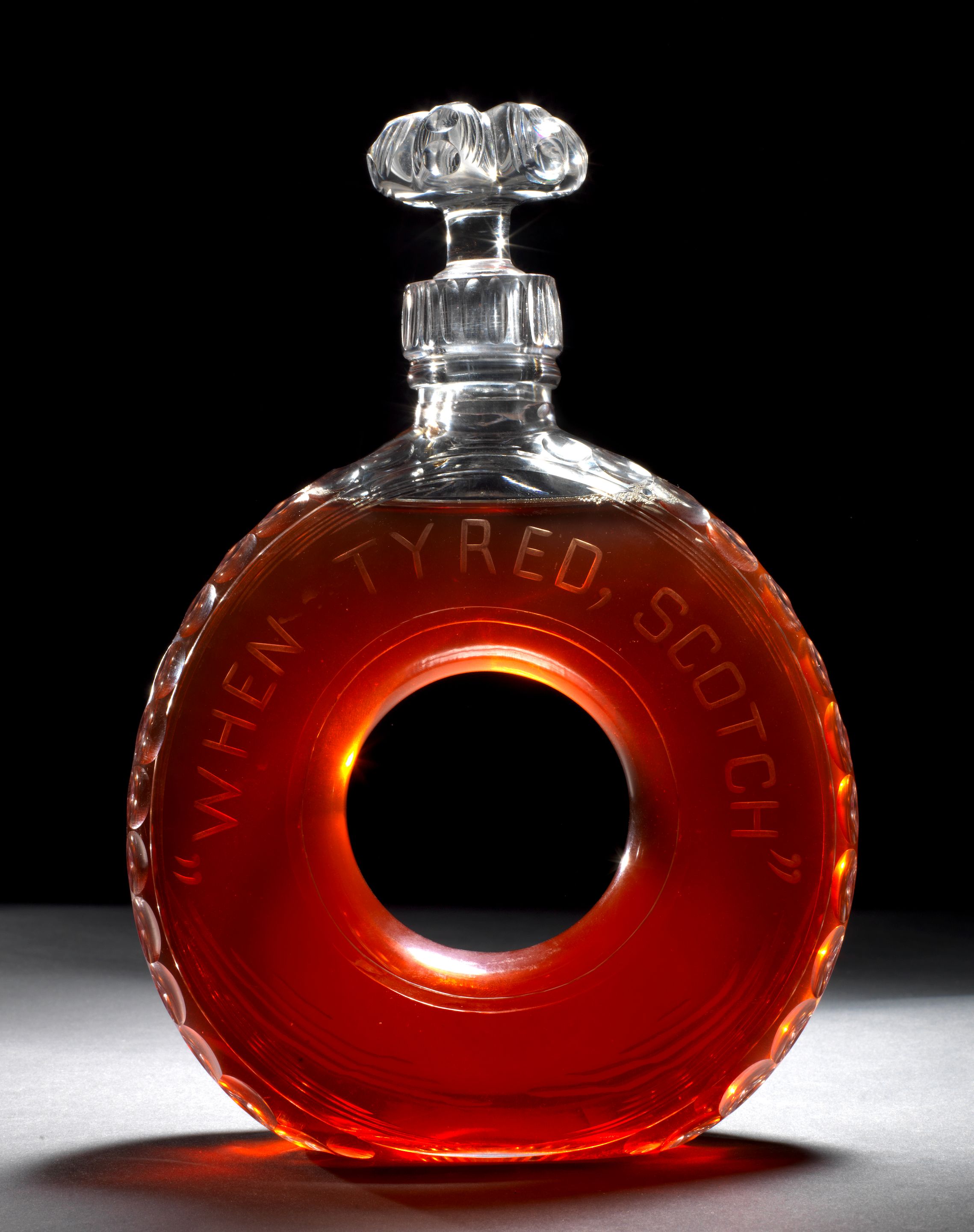 Bonhams Cars : A novelty "When Tyred, Scotch" cut glass whisky decanter ...