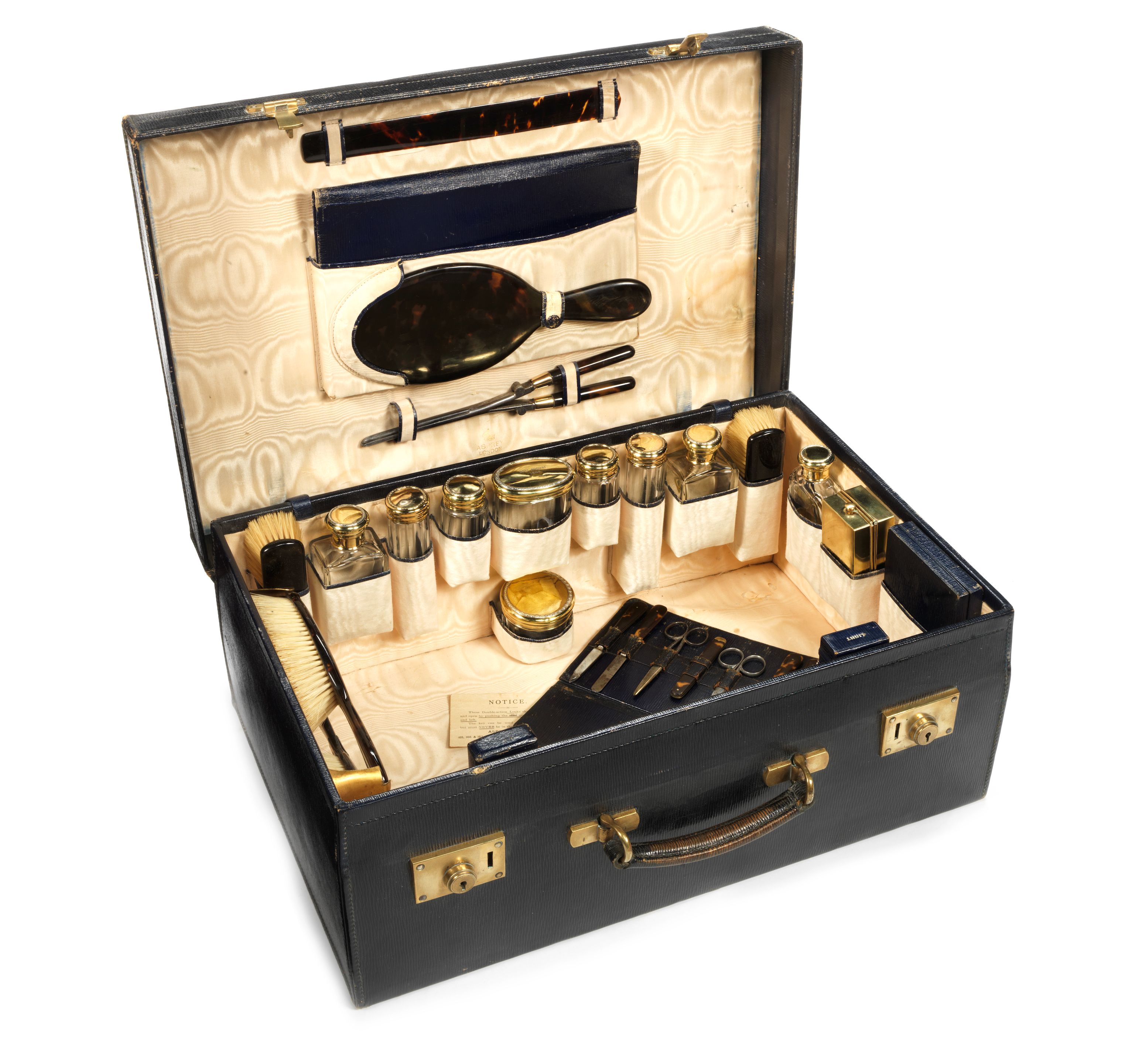 Bonhams Cars : A leather-cased gentlemans' vanity set with sterling ...