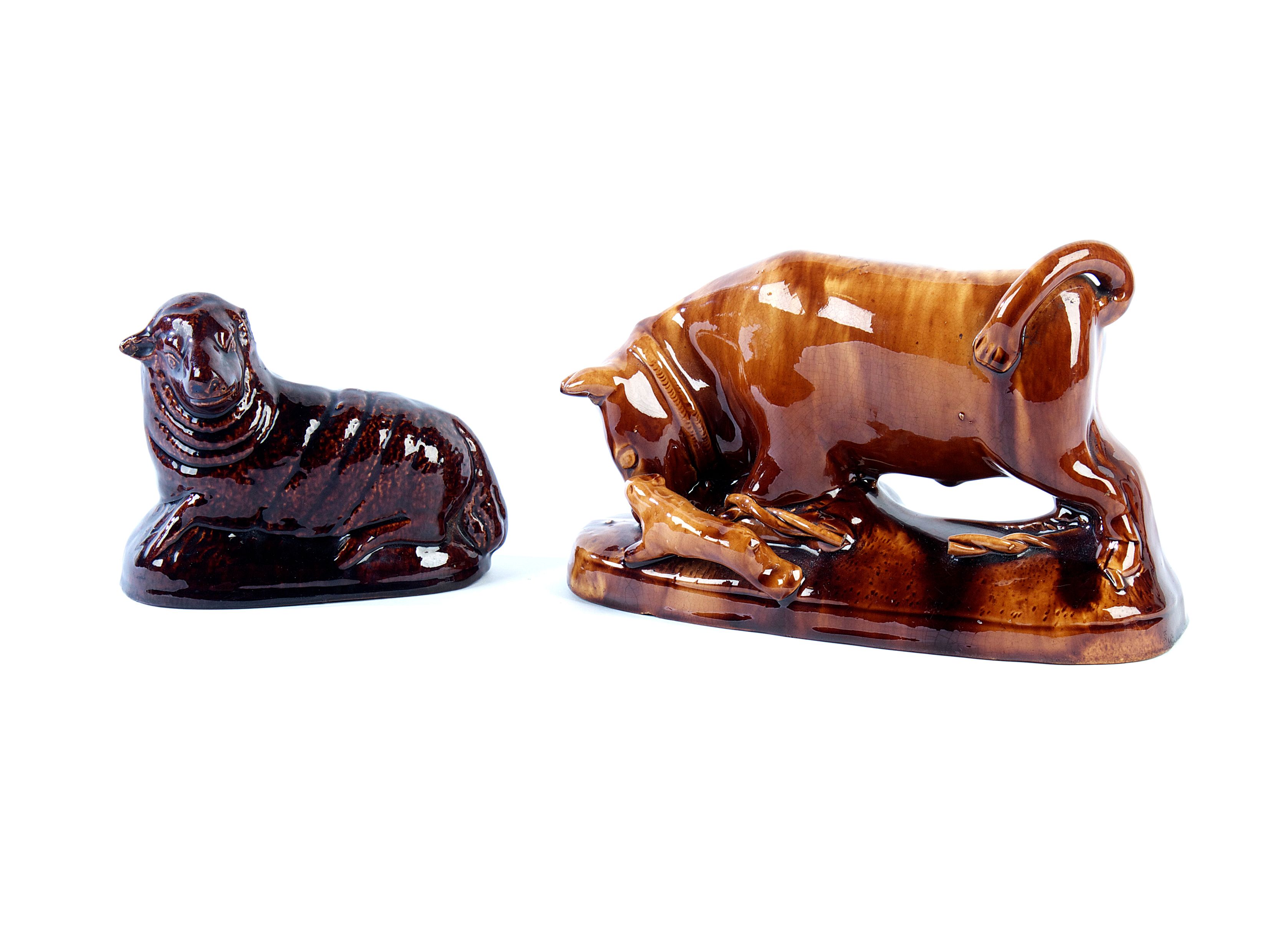 Bonhams : A treacle-glaze bull-baiting group and a model of a sheep ...