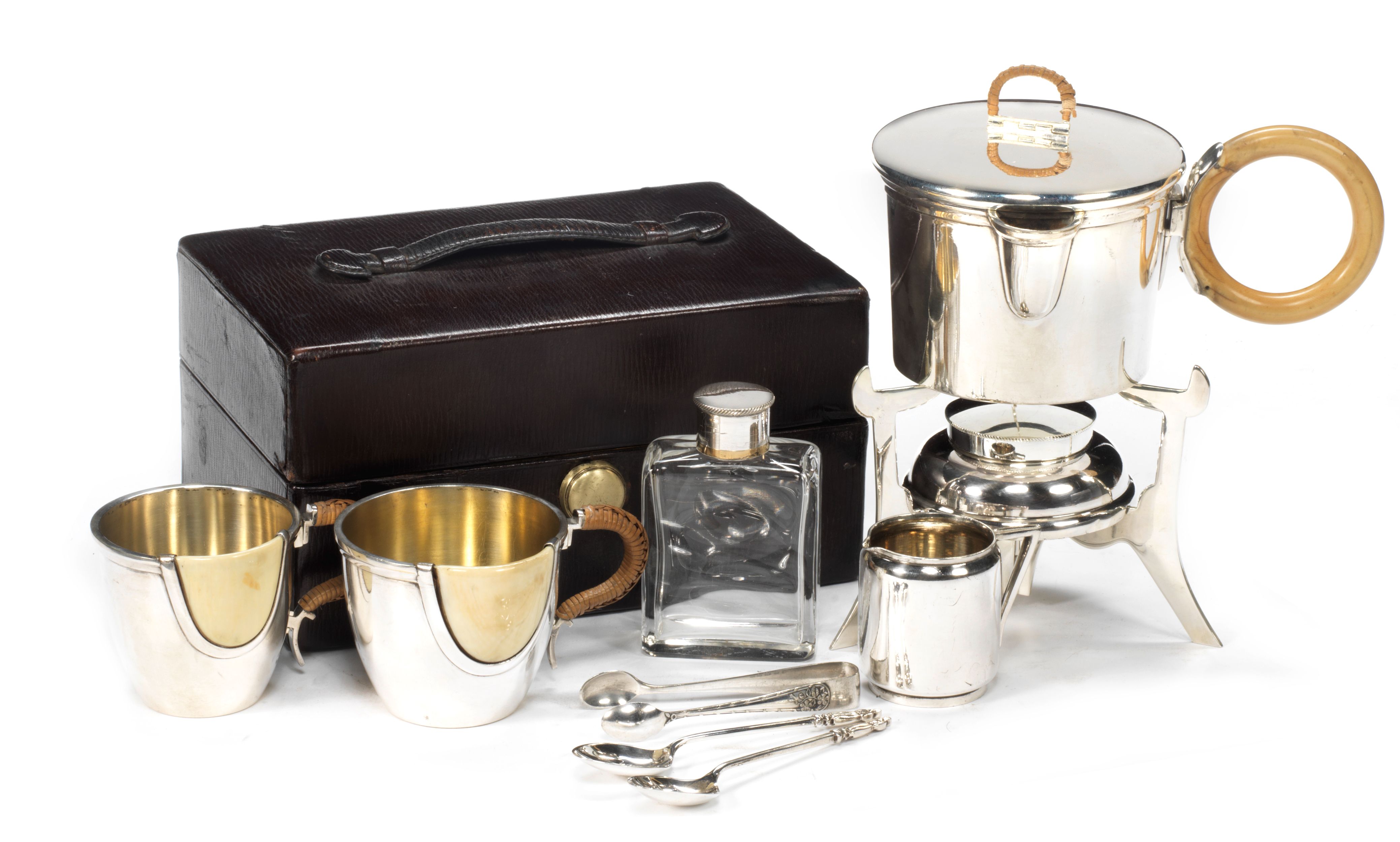 Bonhams Cars : A fine leather-cased tea set for two persons, by Tonnel ...